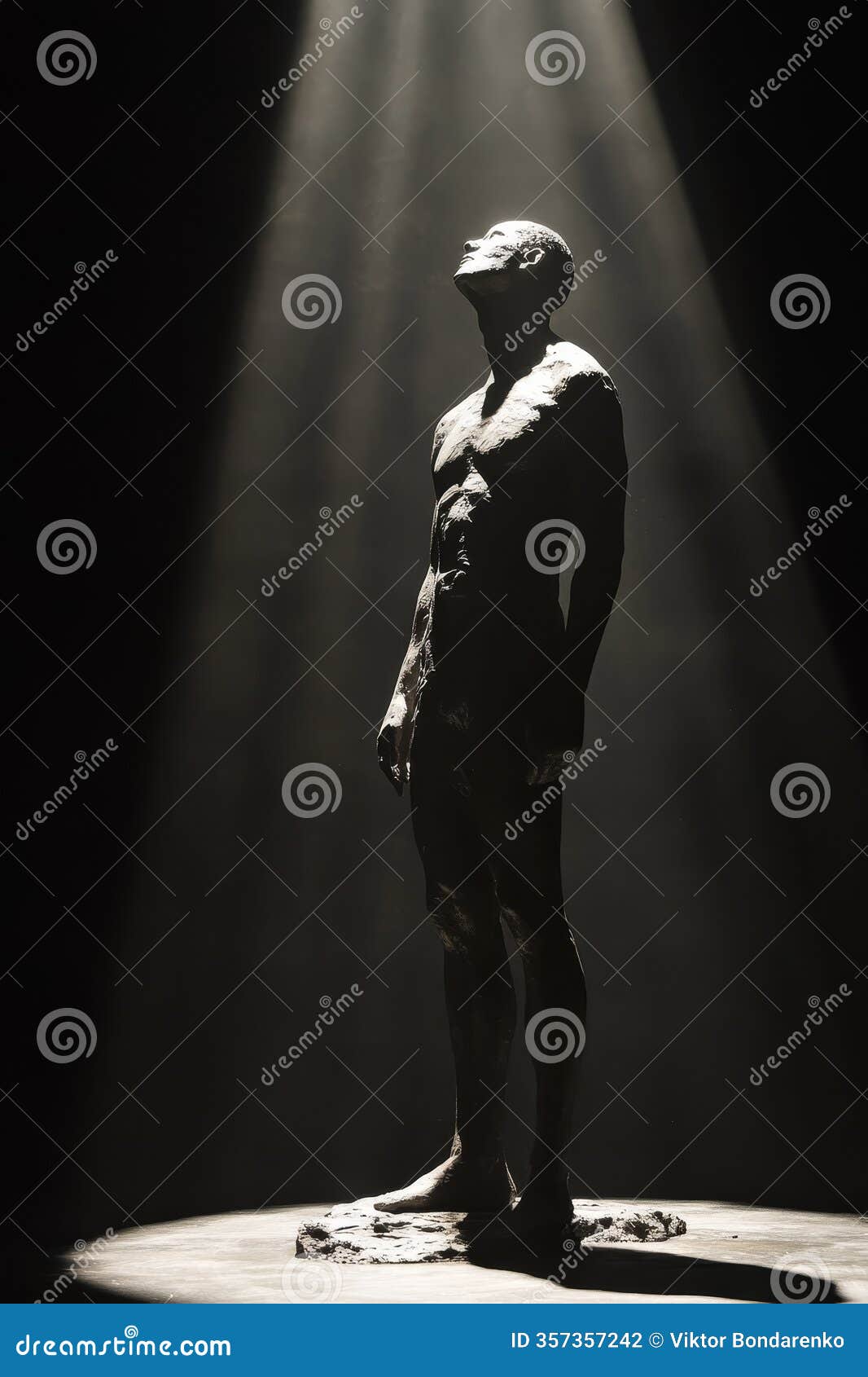 Figure of a Man in a Spotlight Stock Photo - Image of spotlighted ...