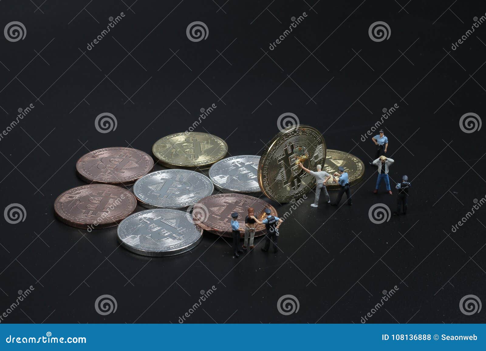 The Figure Police Catch the Hacker with Bitcoins Stock Photo - Image of ...