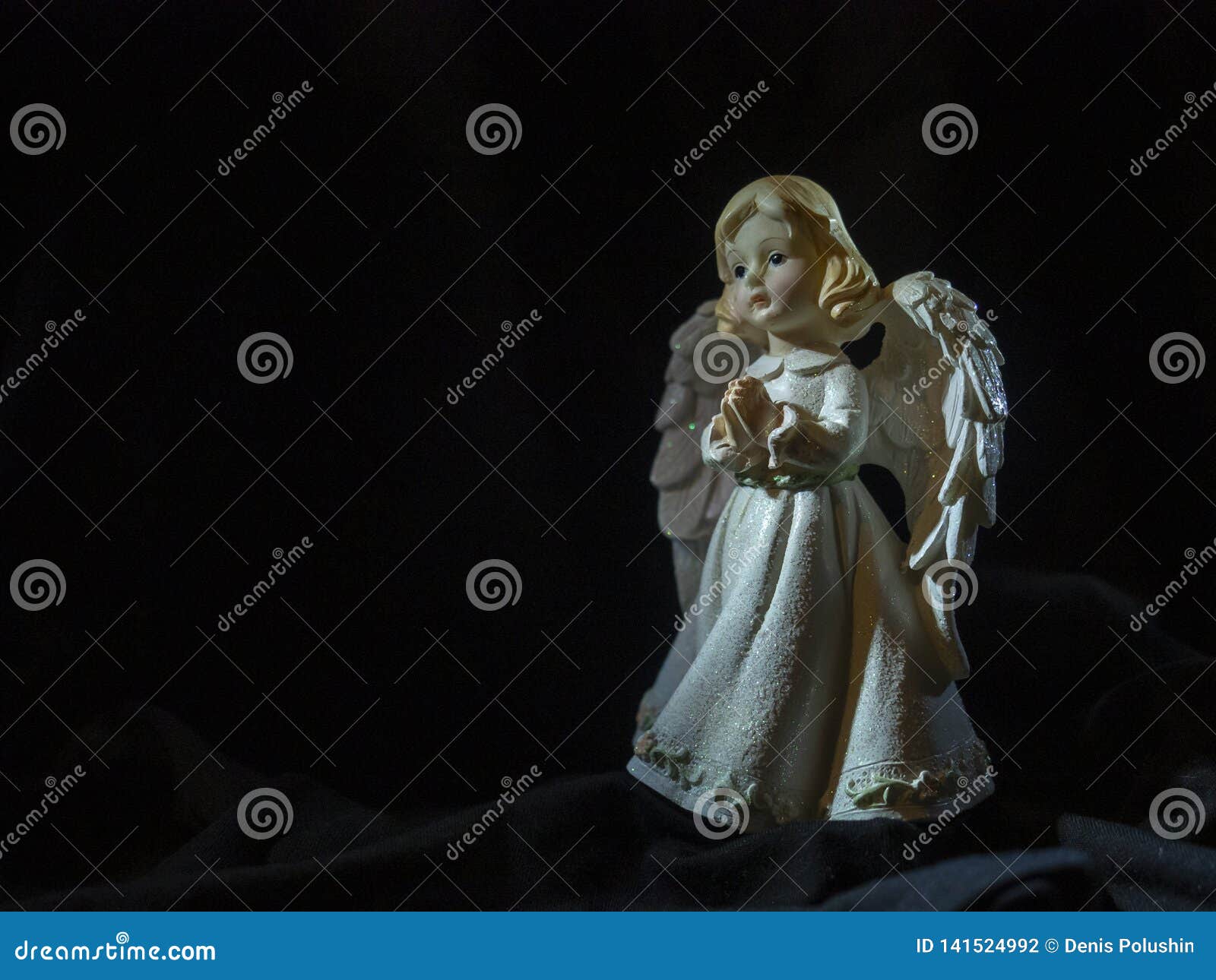 Figure Praying Angel in the Night on a Dark Background Stock Photo ...