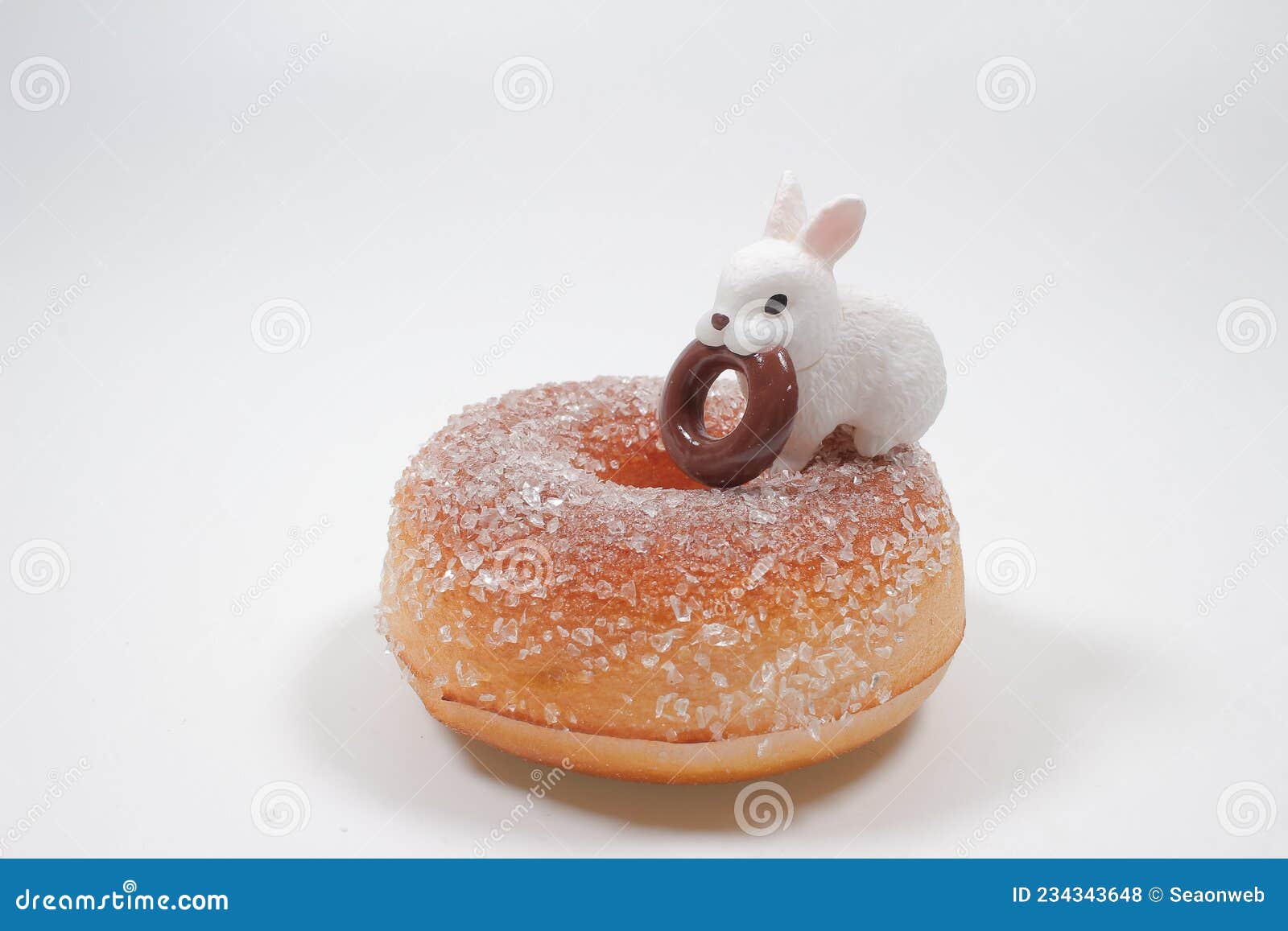 A Figure of Rabbit Steal the Chocolate Donut Stock Photo - Image of ...