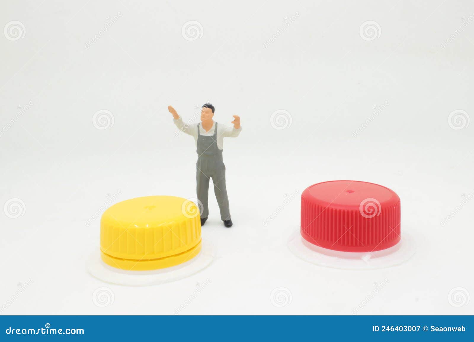 The Figure with the Red and Yellow Button Stock Image - Image of ...