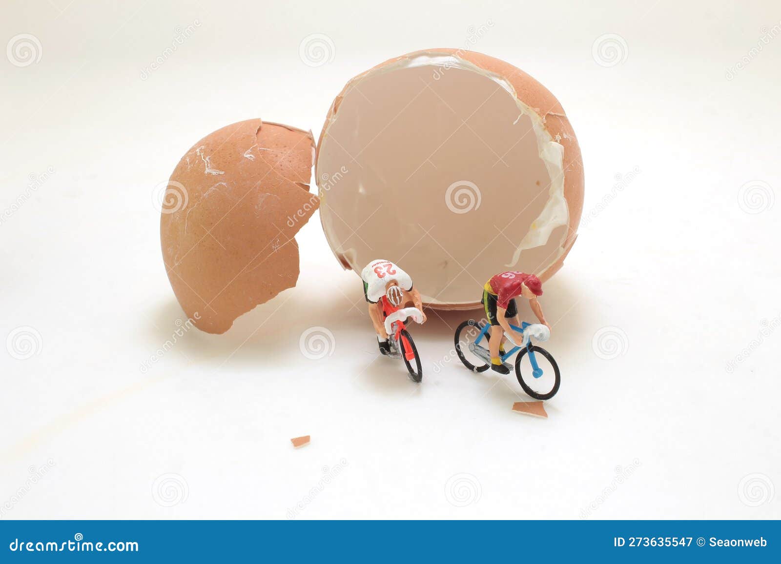 A Figure Ride the Bike with Egg Shell Stock Image - Image of hole, farm ...
