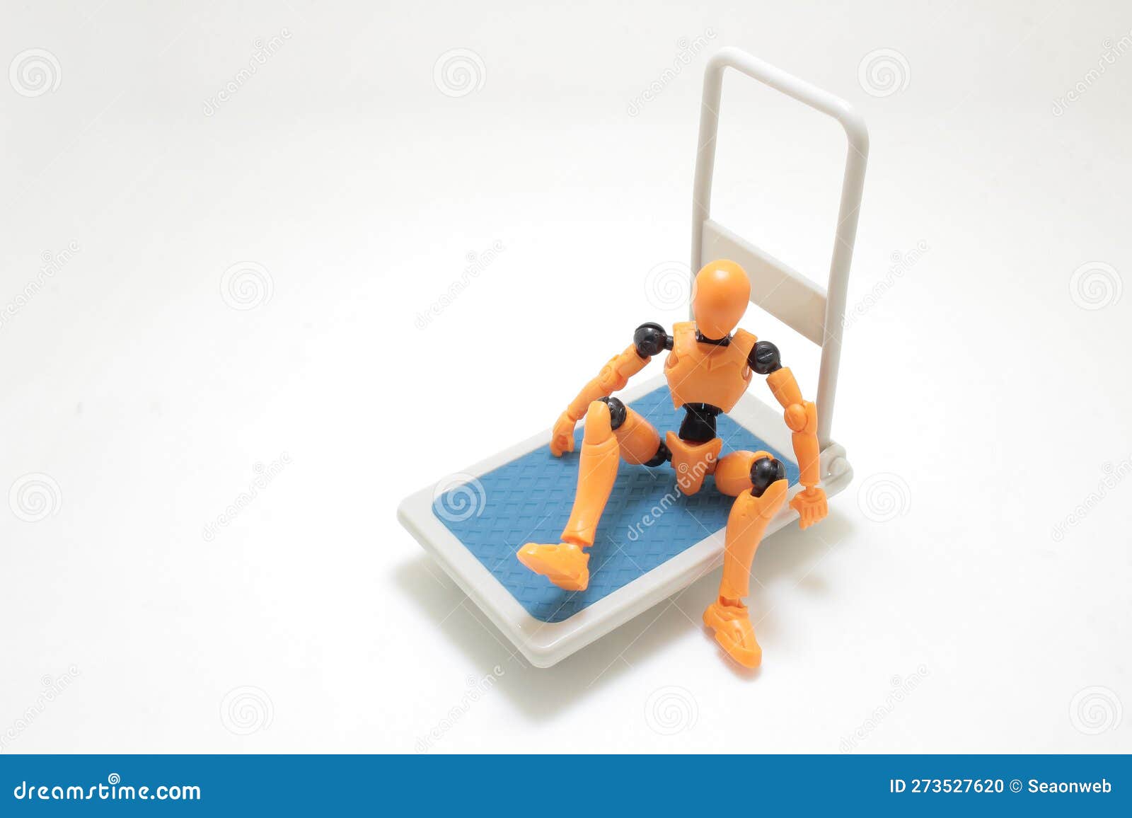 A Figure Sit on Warehouse Trolley Isolated Stock Photo - Image of ...