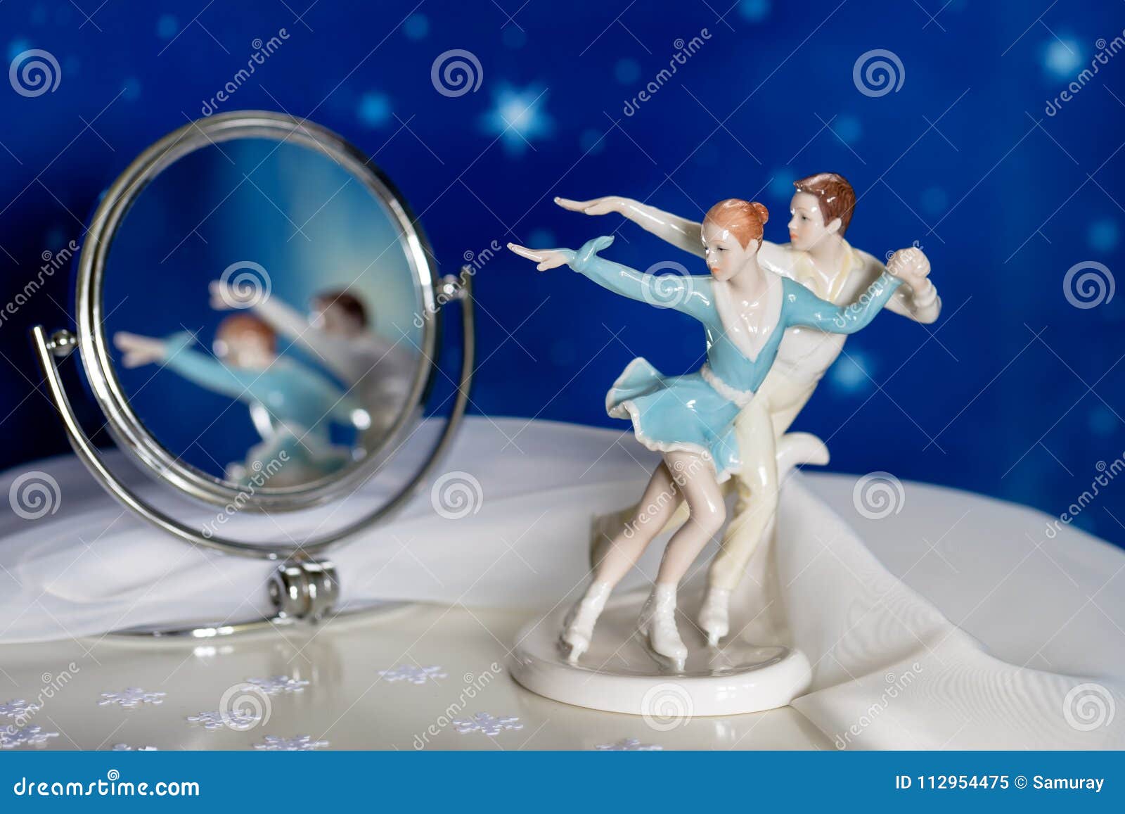 Figure Skaters with Reflection in a Mirror Stock Image - Image of ...
