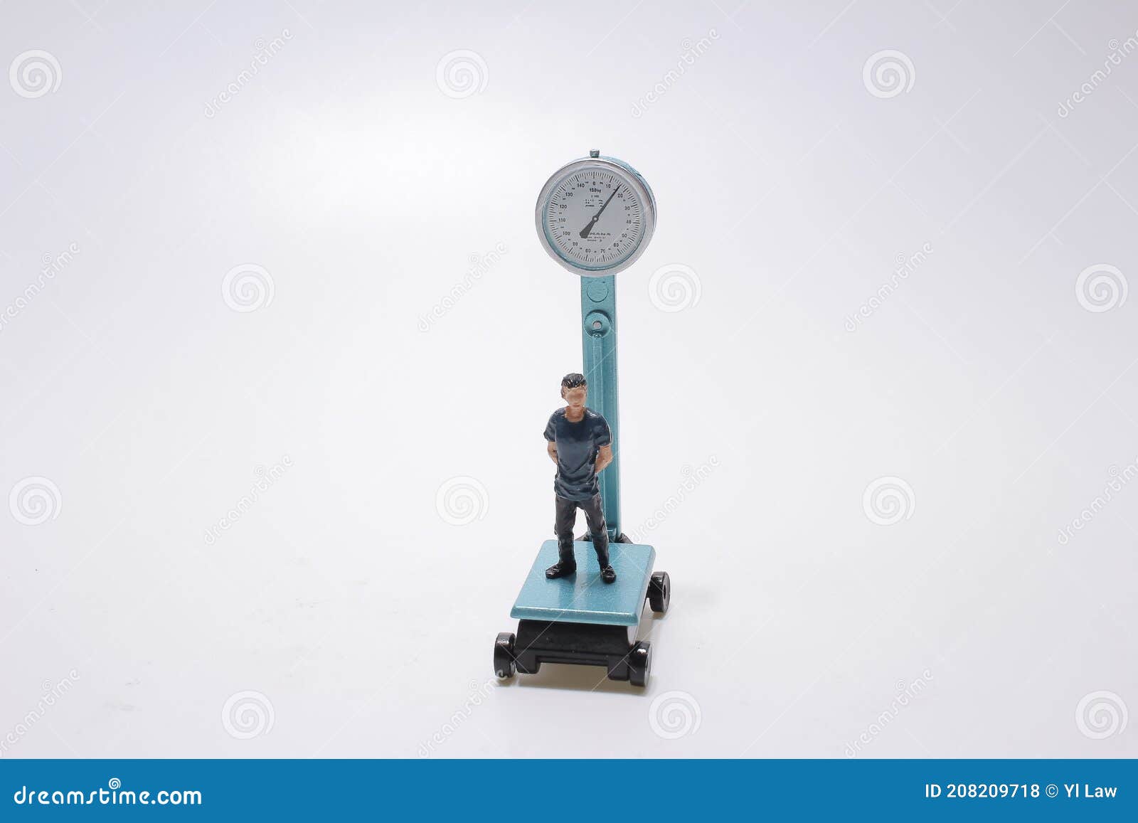 A Figure of Young Healthy Man on the Scales Stock Photo - Image of ...