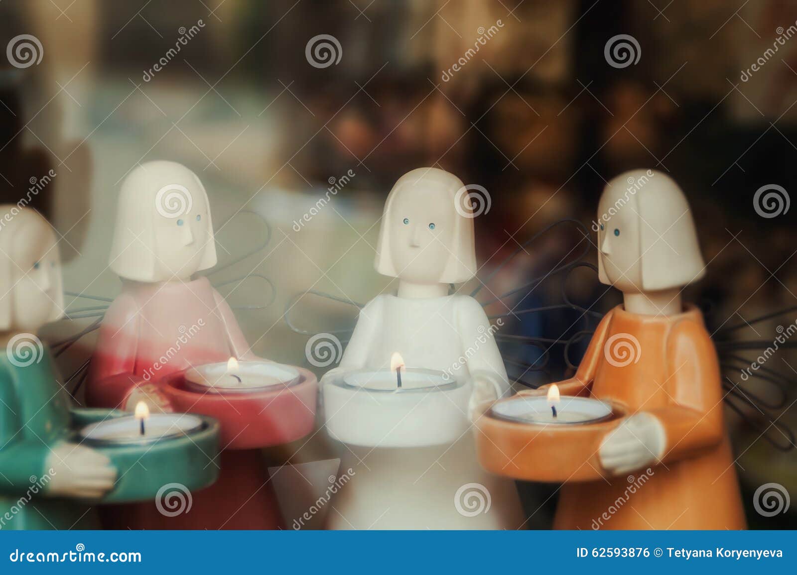 Figures of Angels with Candles Stock Photo - Image of easter, flame ...