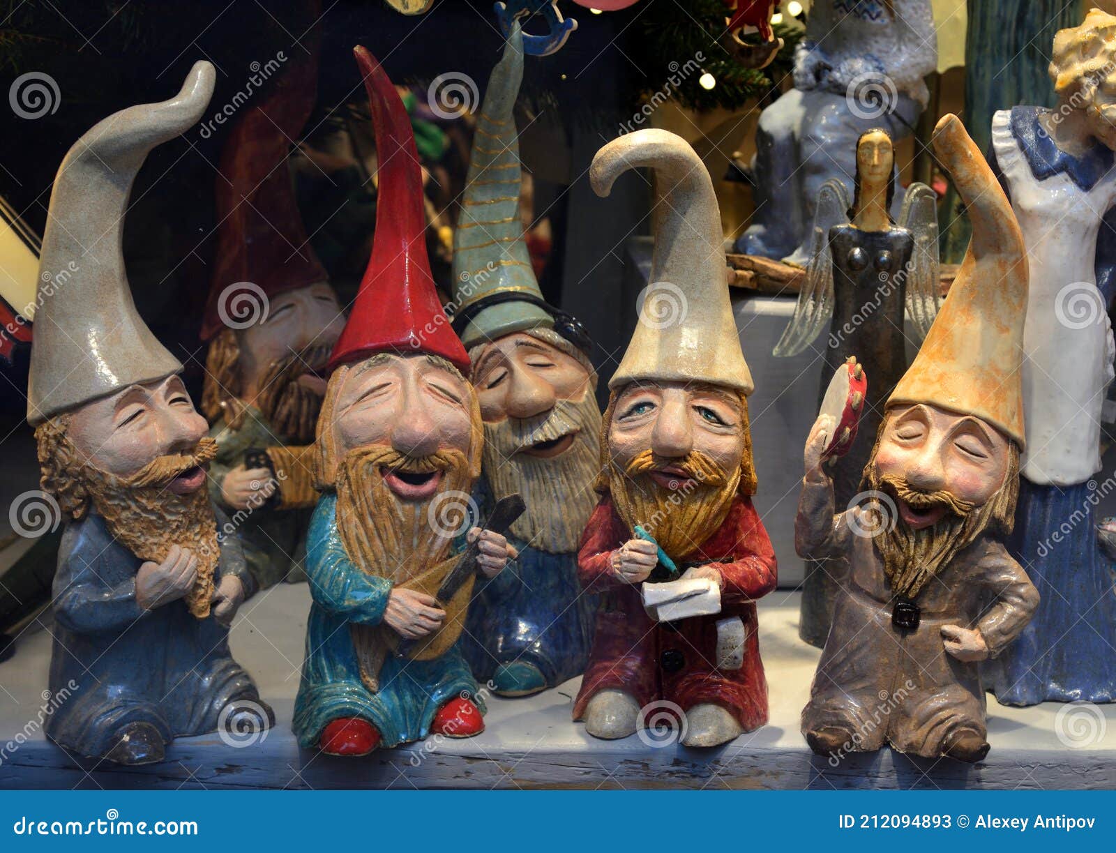 Figures of Cheerful Gnomes in Multi-colored Hats Stock Image - Image of ...