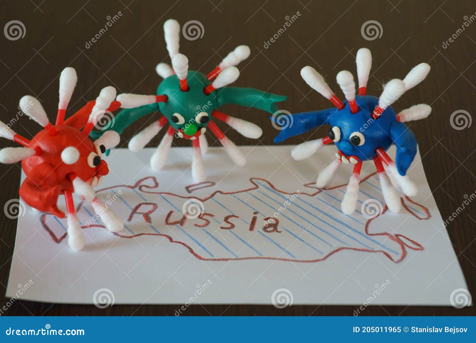 Figures of Multi-colored Viruses Made of Plasticine. Next To it is a ...