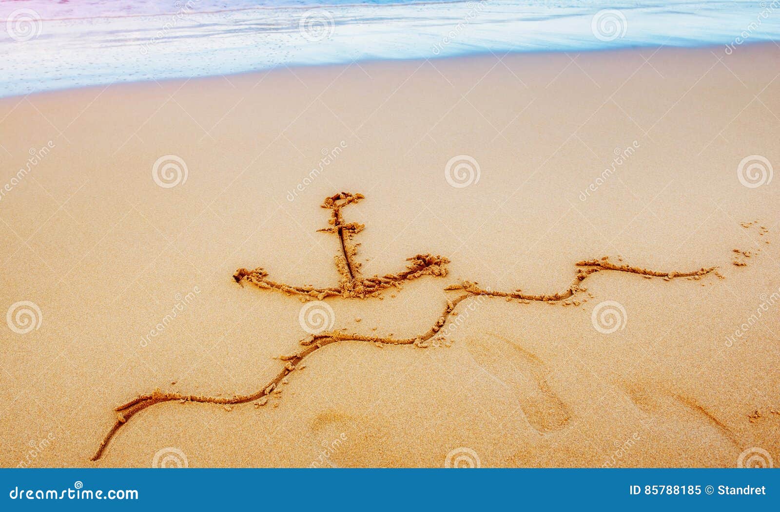 Figures in the Sand on the Beach Stock Image - Image of clear, beach ...