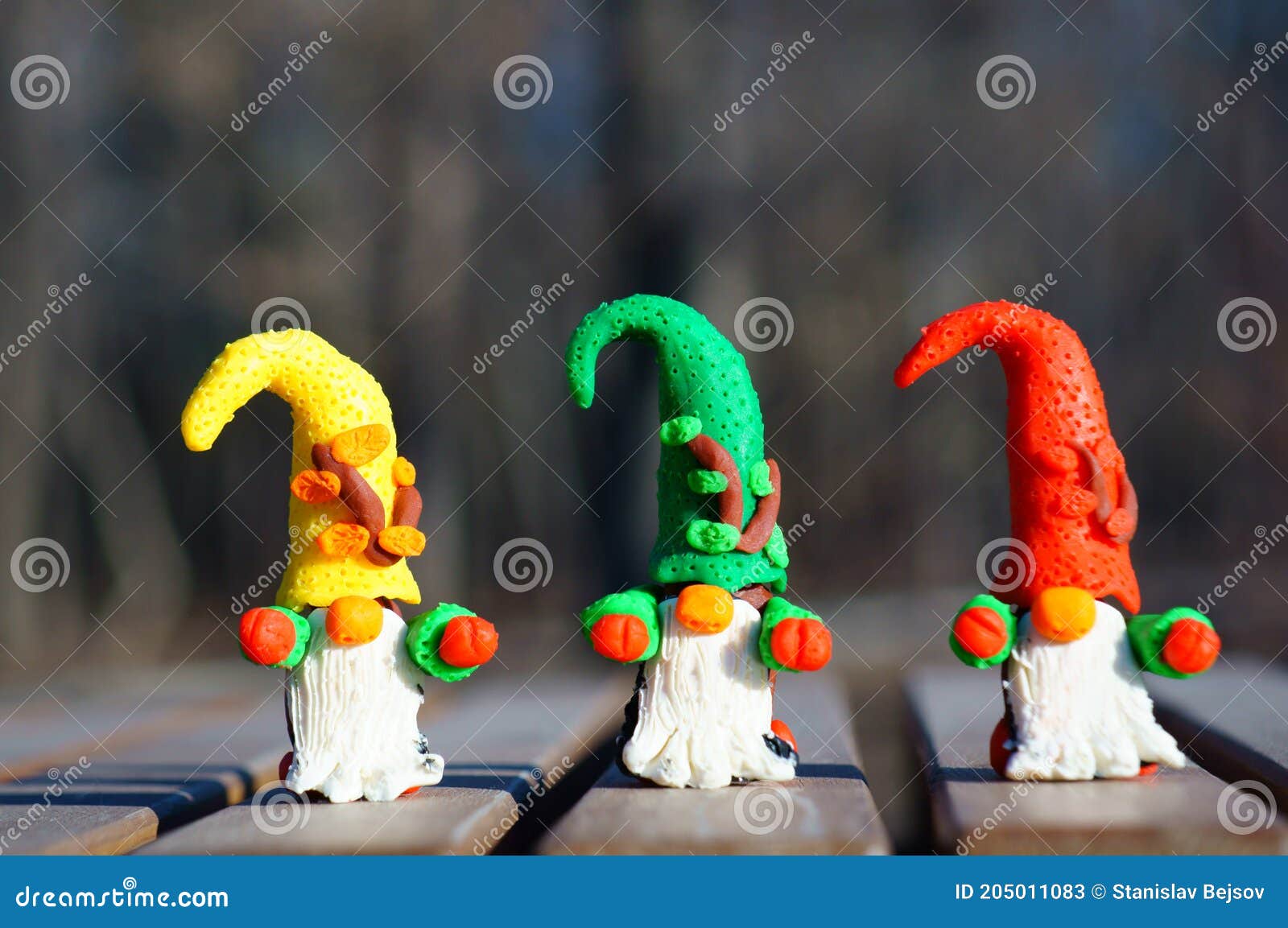 Figures of Three Dwarfs in the Park on a Bench Stock Image - Image of ...