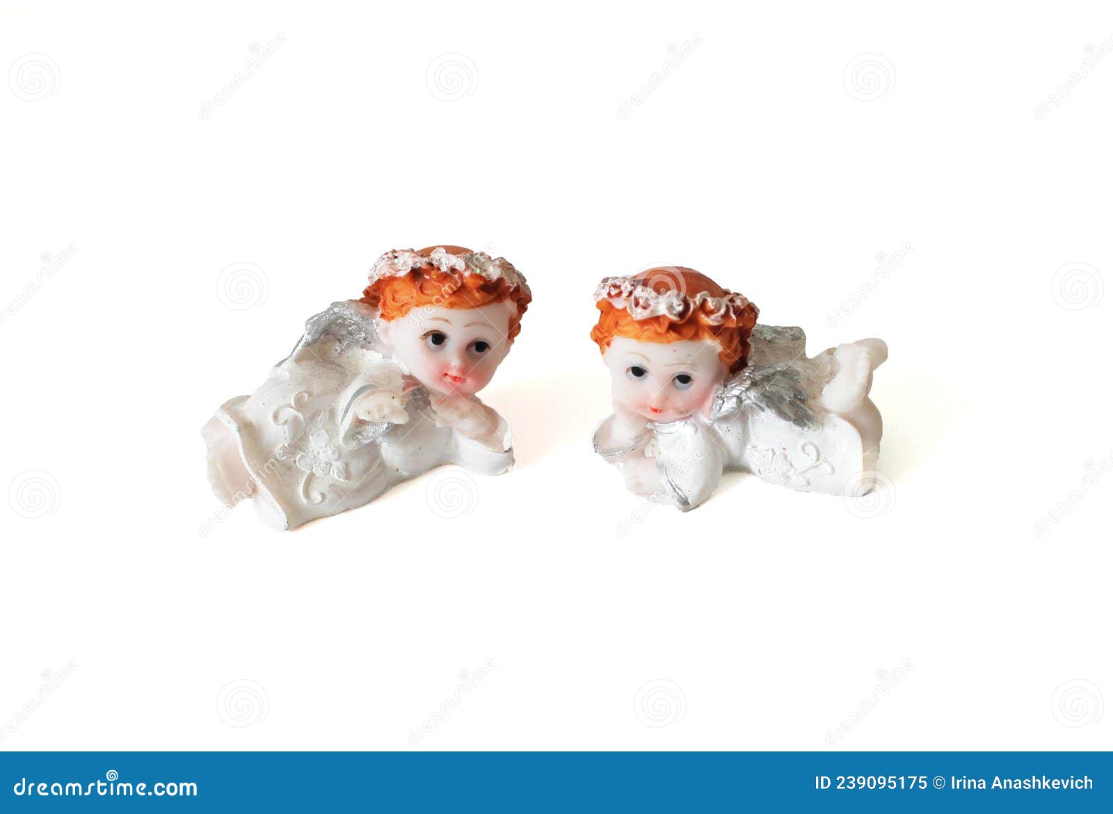 Figures of Two Little White Angels on a White Background Stock Image ...