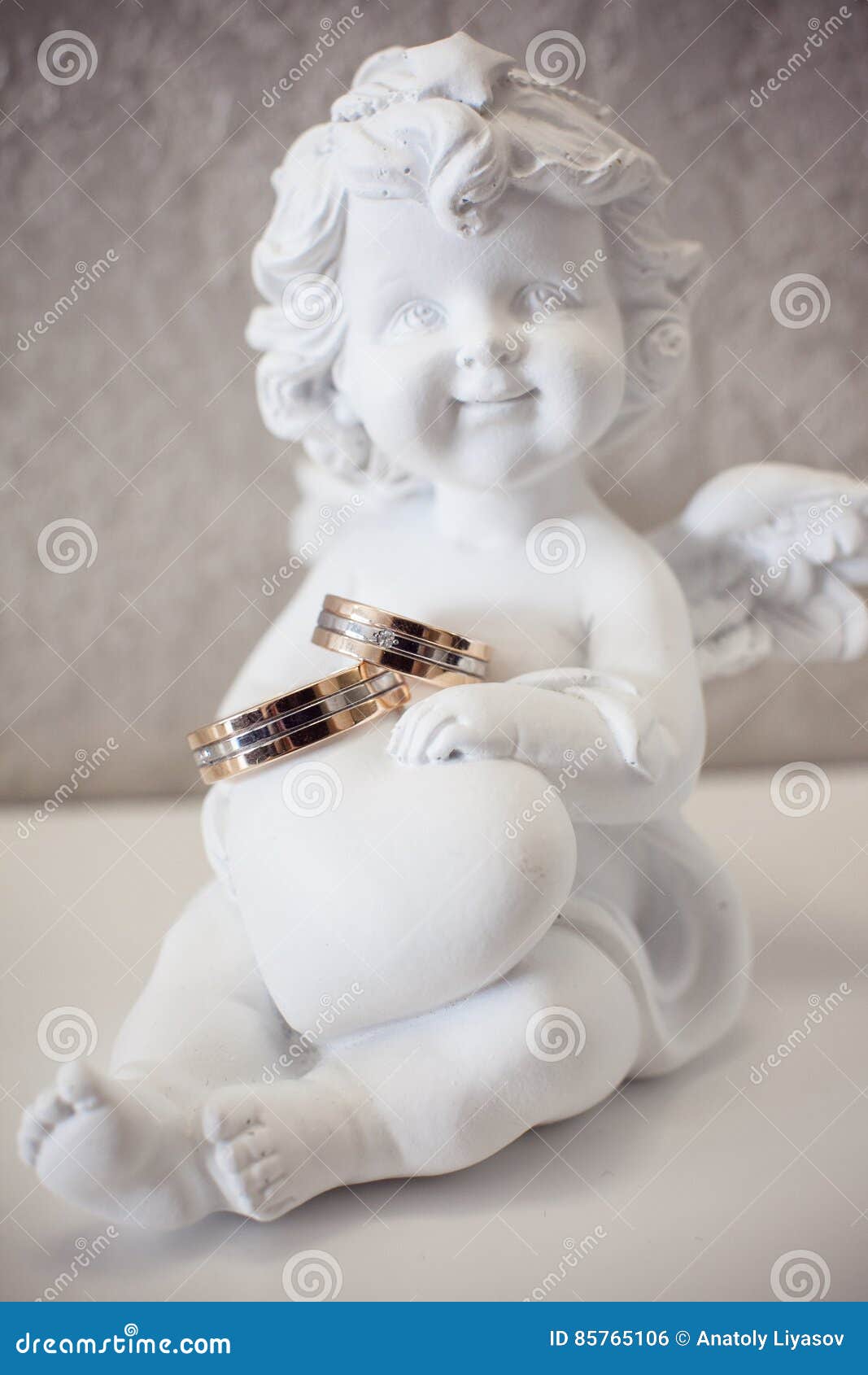 Figurine of an Angel with Rings Stock Photo - Image of character ...
