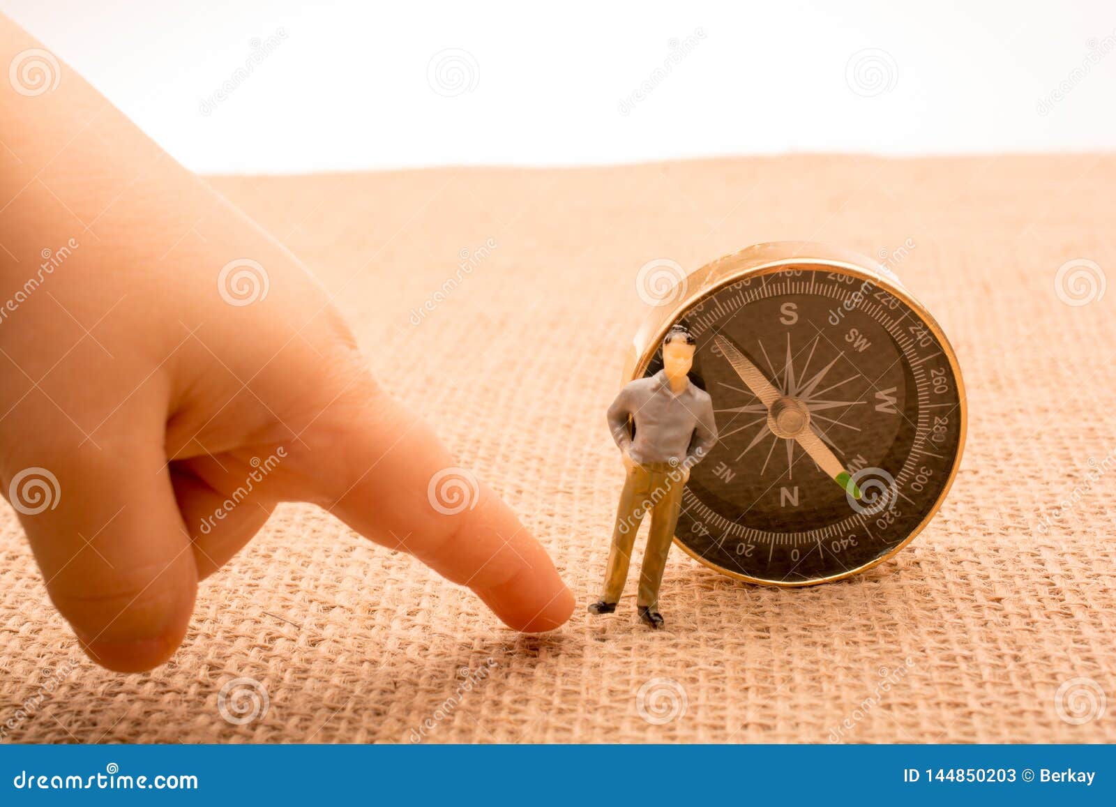 Figurine by the Side of a Compass Stock Image - Image of geography ...