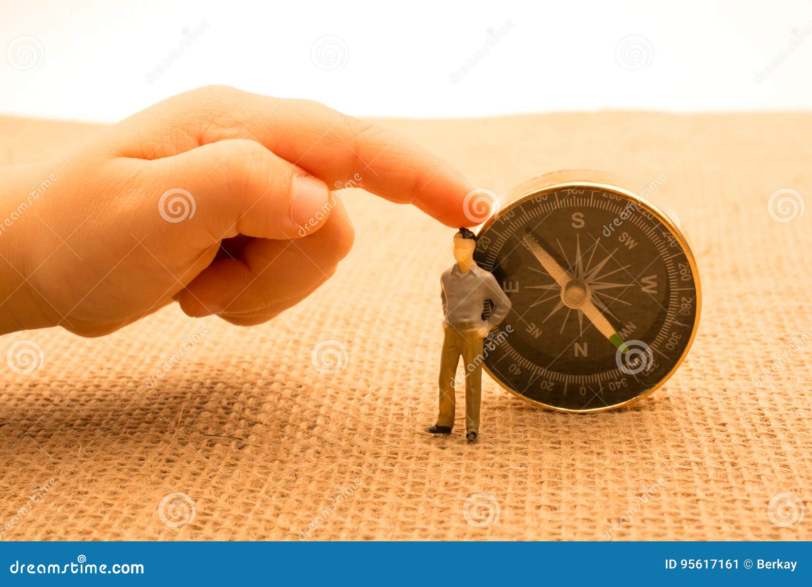 Figurine by the Side of a Compass Stock Image - Image of travel ...