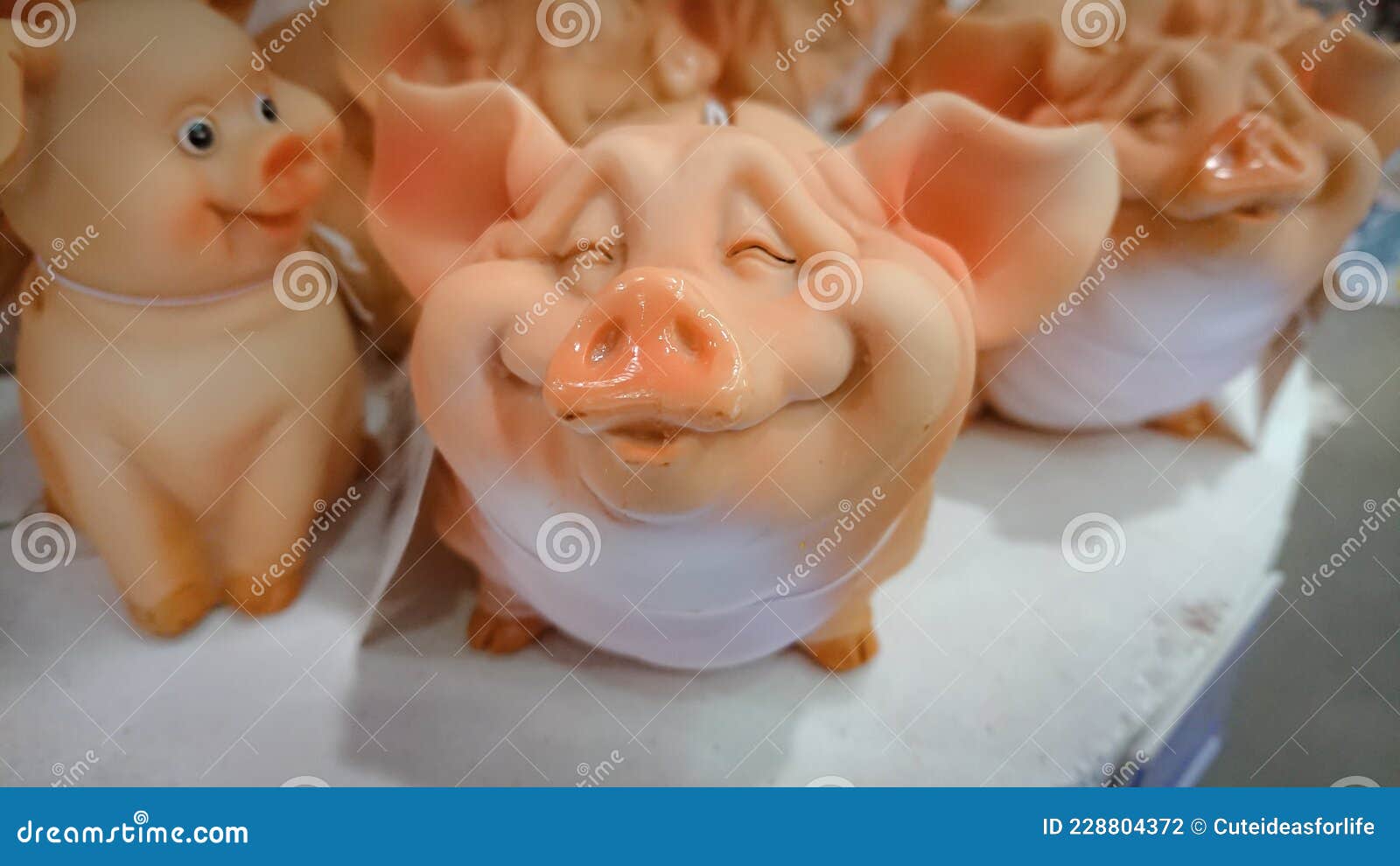 Figurines of Pigs on a Shelf in a Souvenir Shop Stock Photo - Image of ...