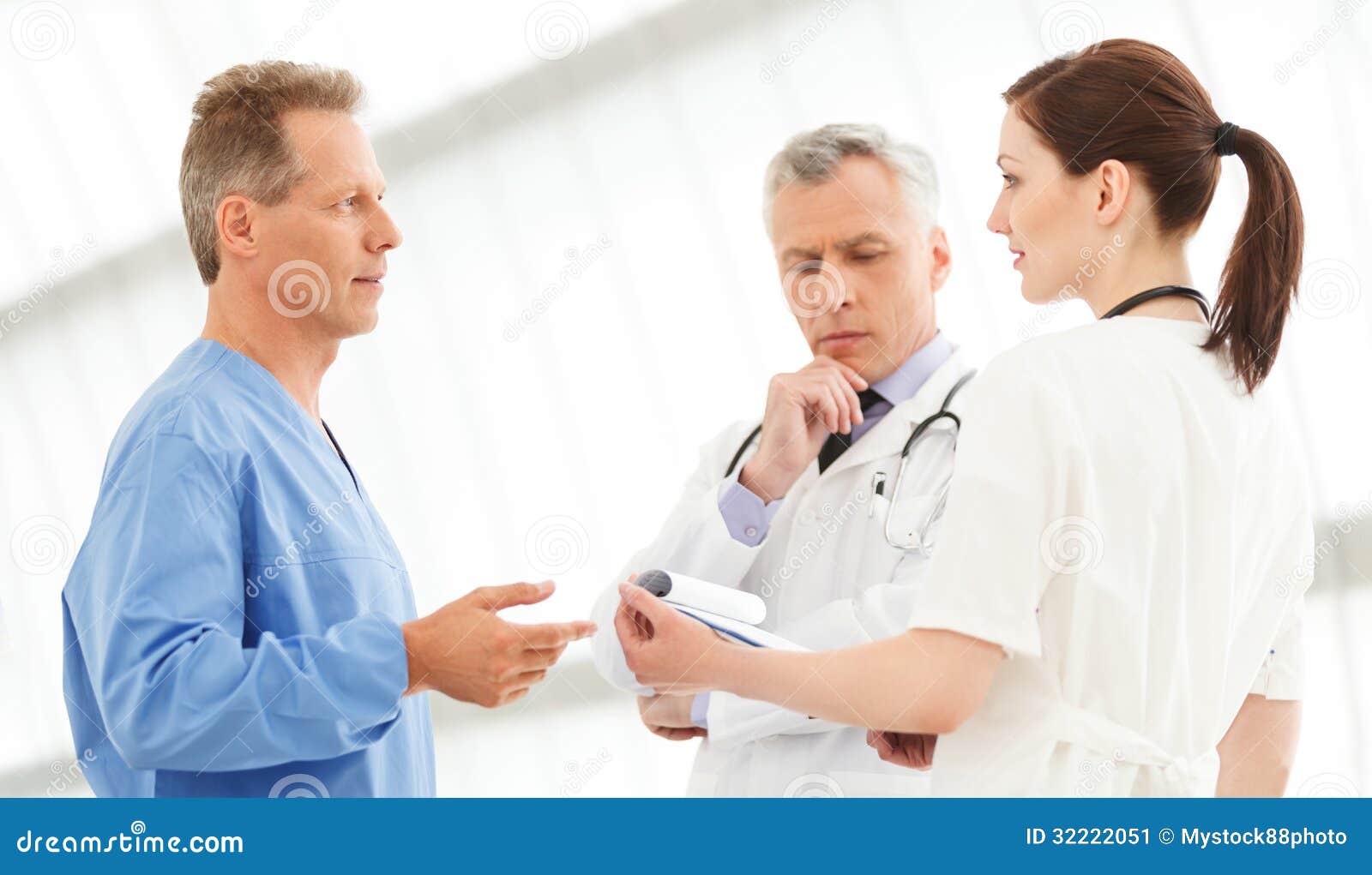 Figuring Out the Correct Medication. Three Doctors Discussing Th Stock ...