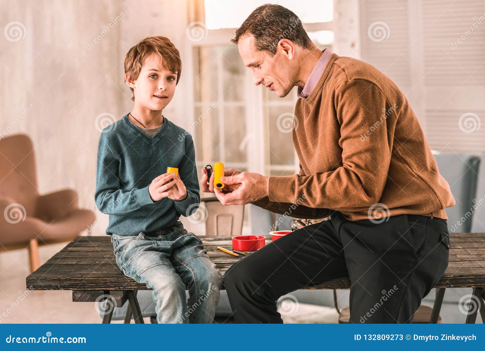 Cute Focused Child Getting Distracted from His Work for a Second. Stock ...