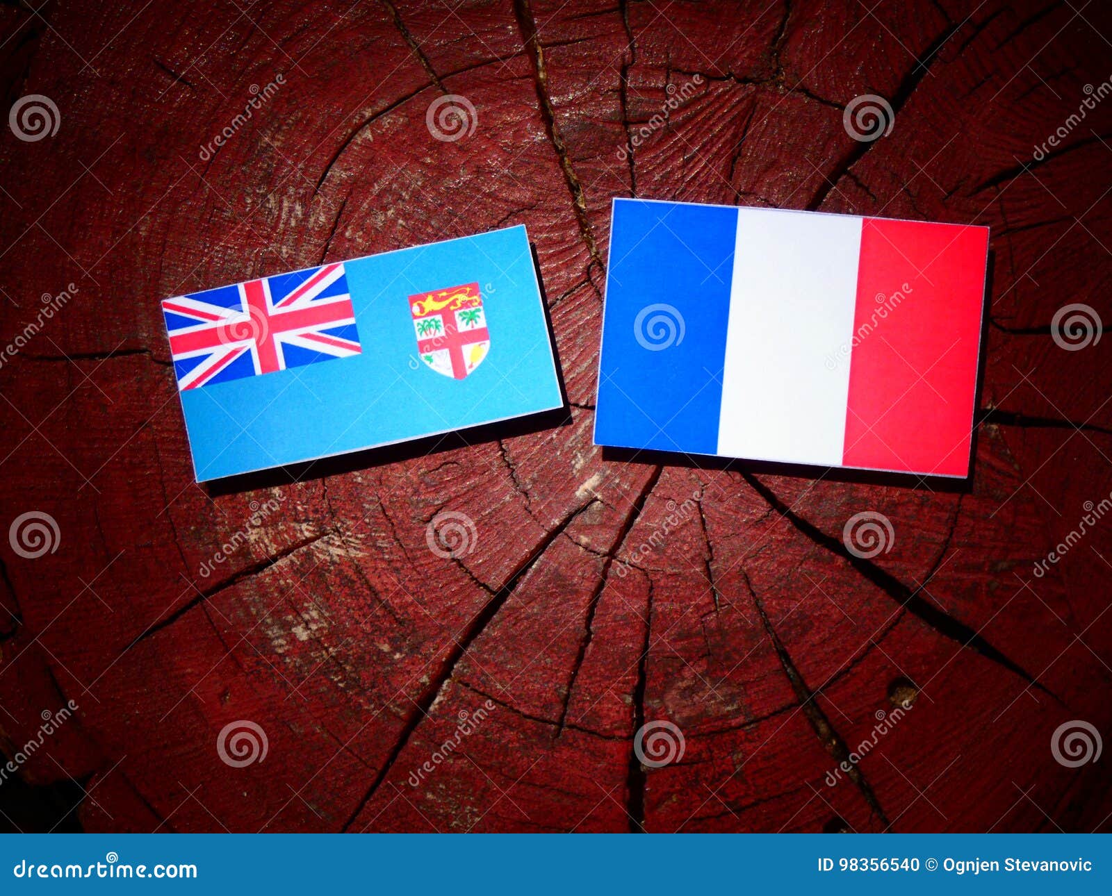 Fijian Flag with French Flag on a Tree Stump Isolated Stock Photo ...