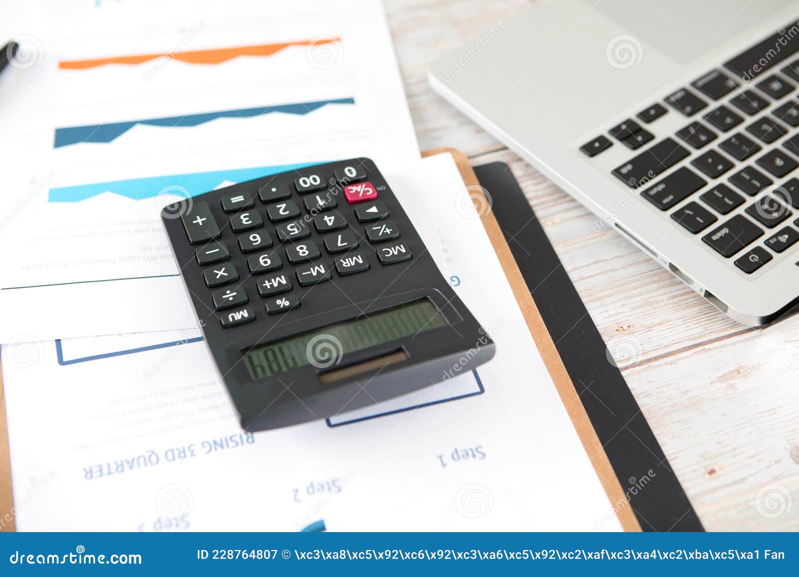 File Calculator and Laptop on the Desk Stock Image - Image of charts ...