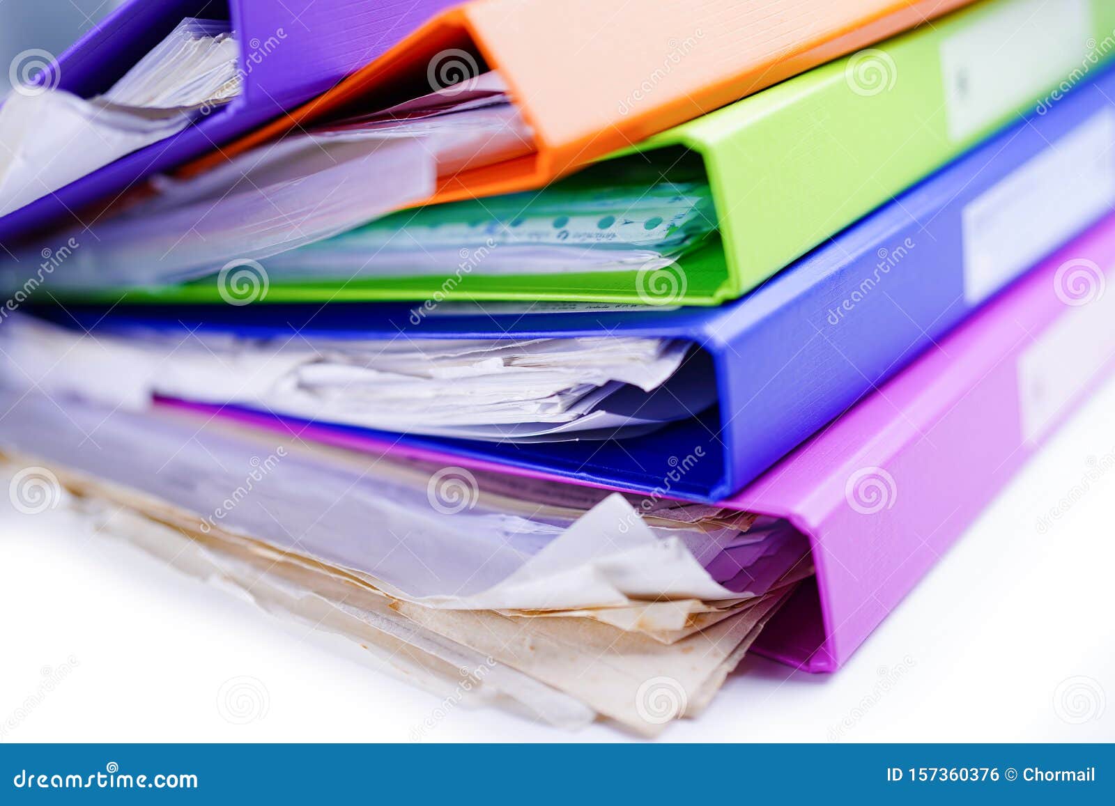 File Folder Binder Stack of Multi Color on Table in Office. Stock Photo ...