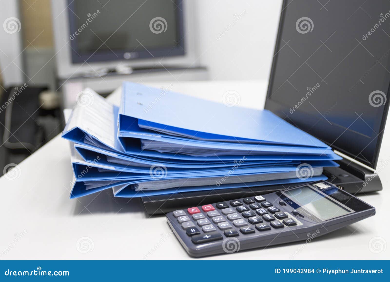 File Folder with Documents and Calculator with Notebook on Table Stock ...