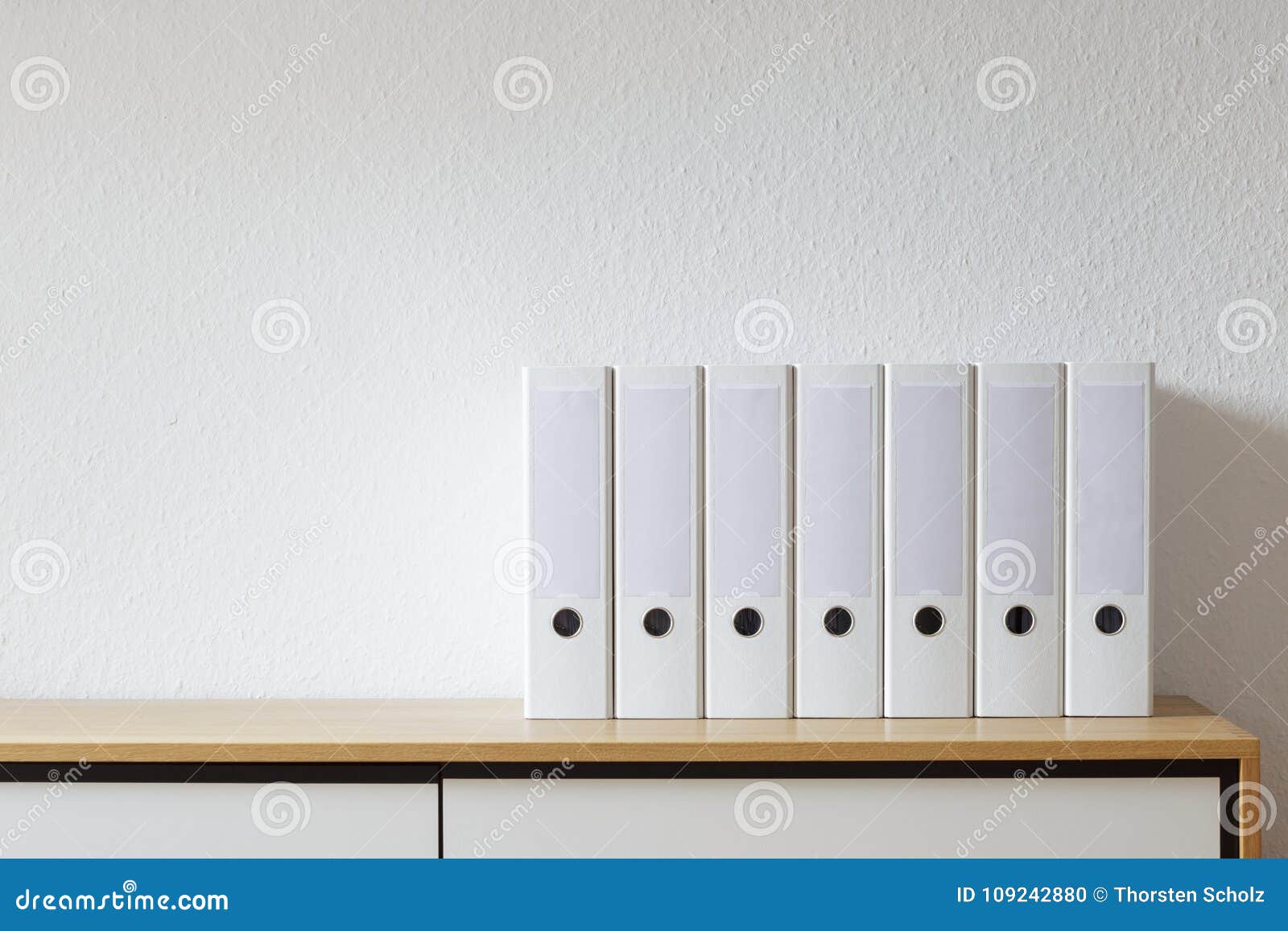 File Folder on Modern Sideboard in Bright Room Stock Photo - Image of ...