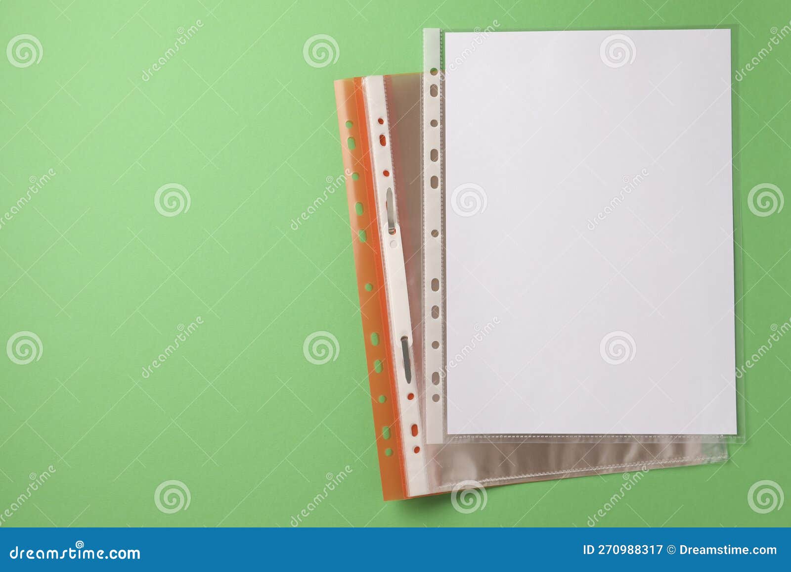 File Folder with Punched Pockets on Green Background, Top View. Space ...