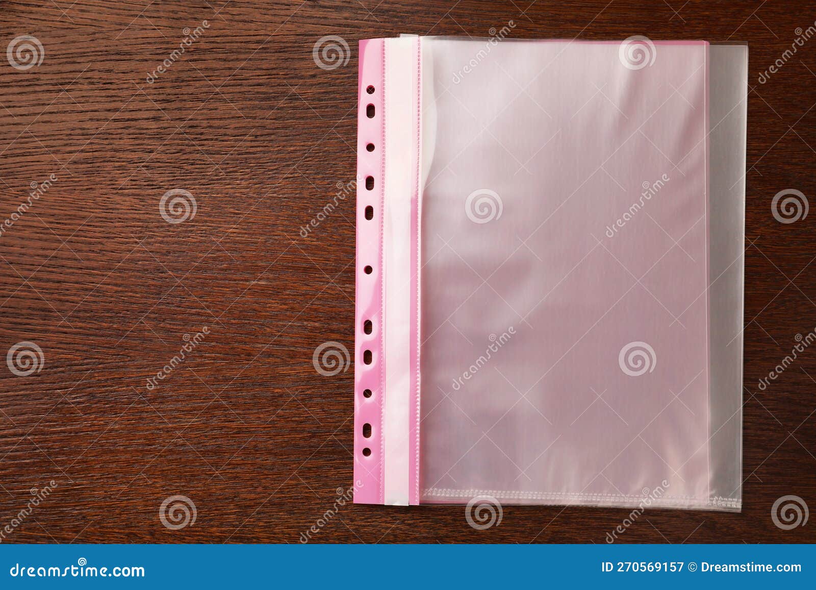 File Folder with Punched Pockets on Wooden Table, Top View. Space for ...