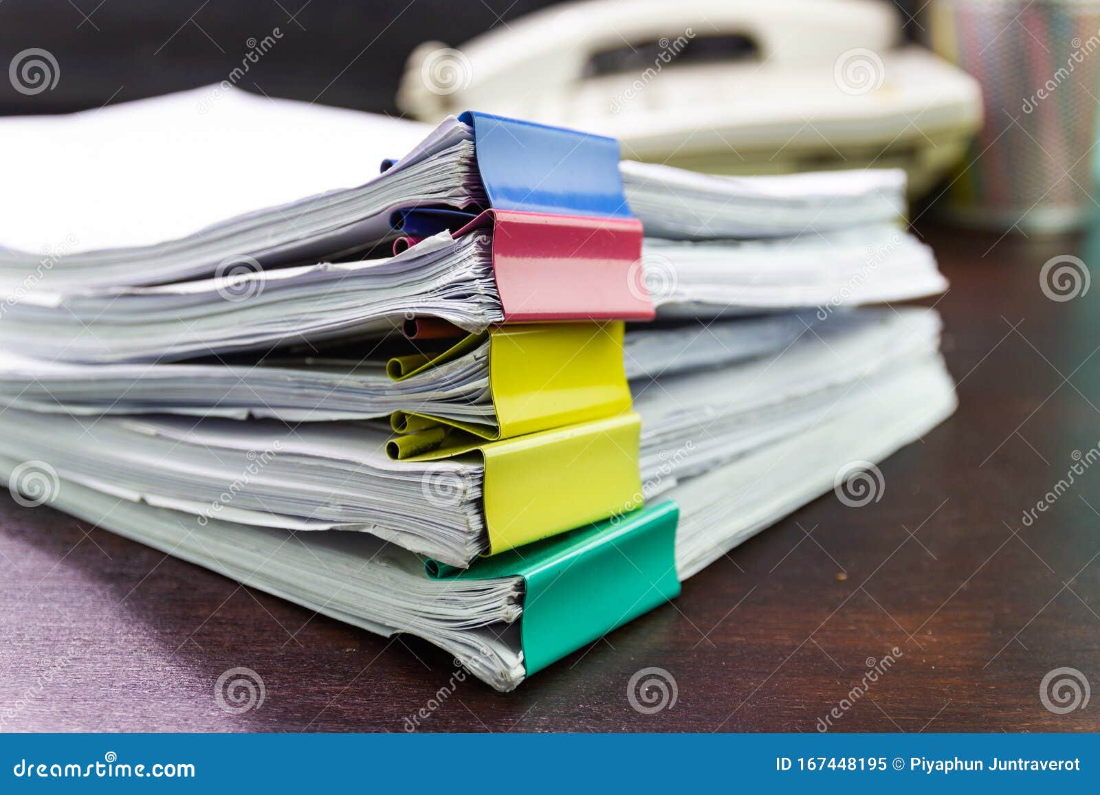 File Folder and Stack of Business Report Paper File on the Table in a ...