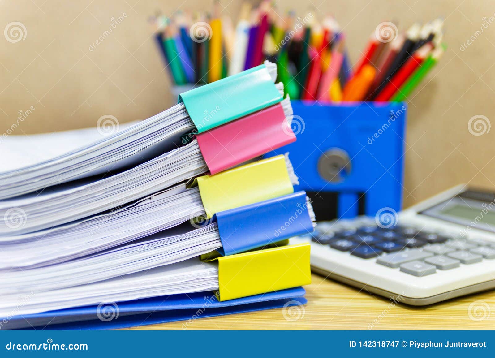 File Folder and Stack of Business Report Paper File on the Table in a ...