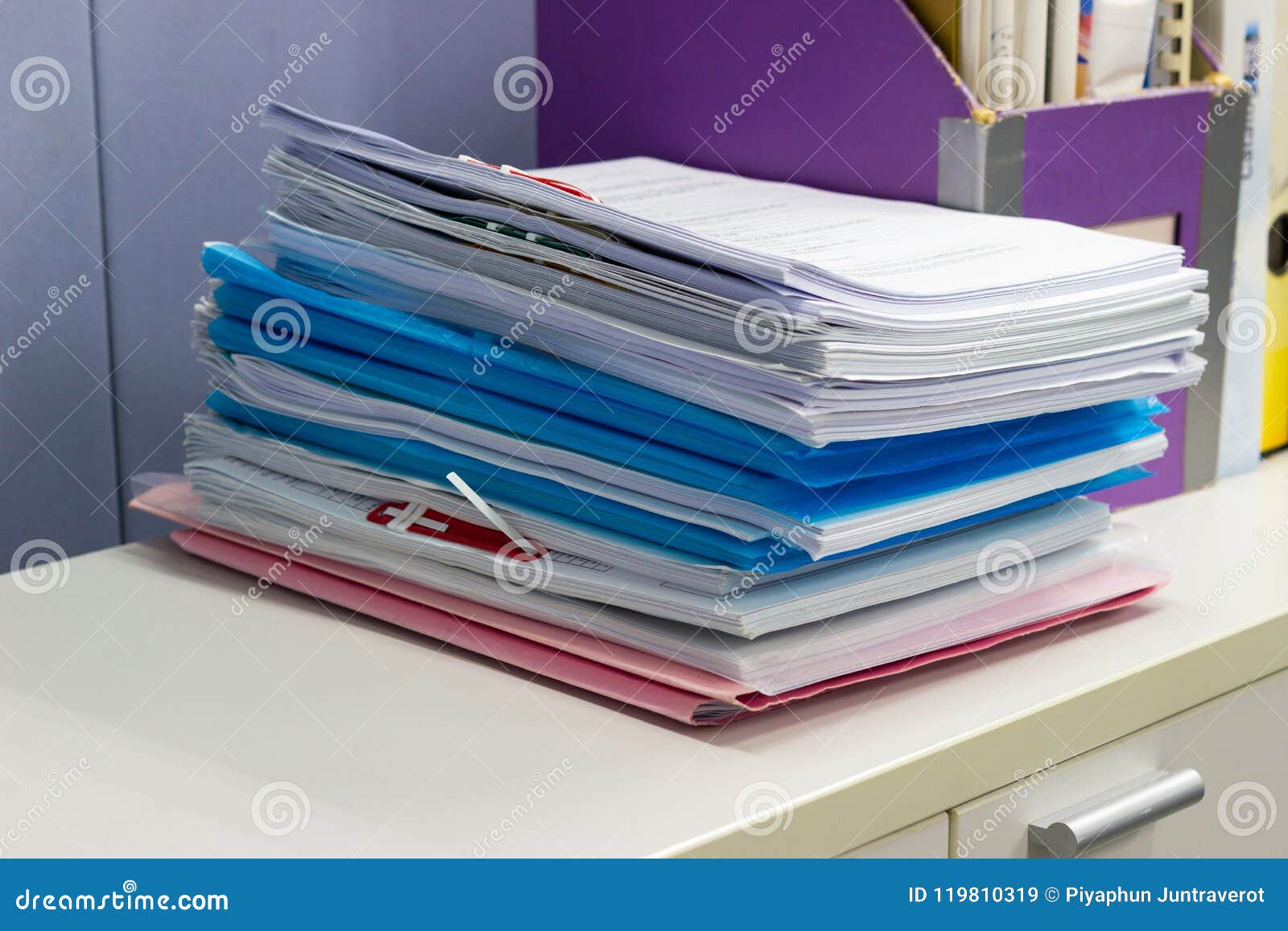 File Folder and Stack of Business Report Paper File on the Table in a ...