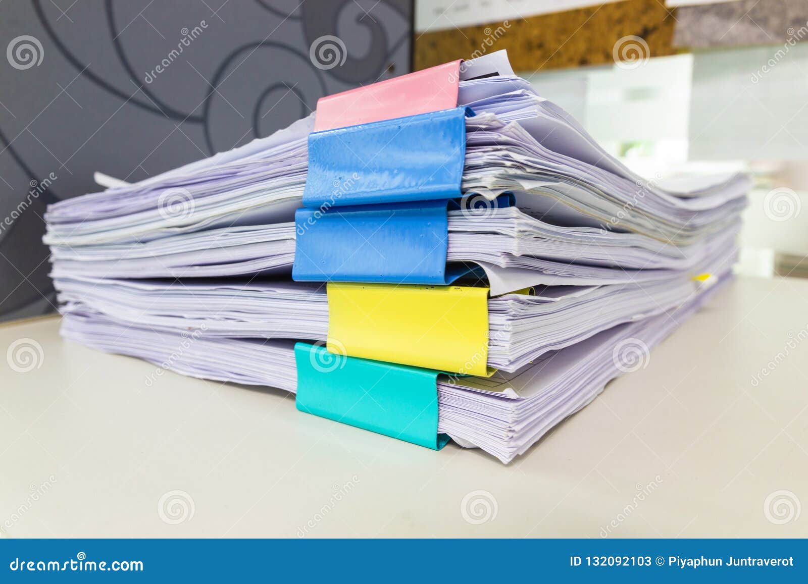 File Folder and Stack of Business Report Paper File on the Table in a ...