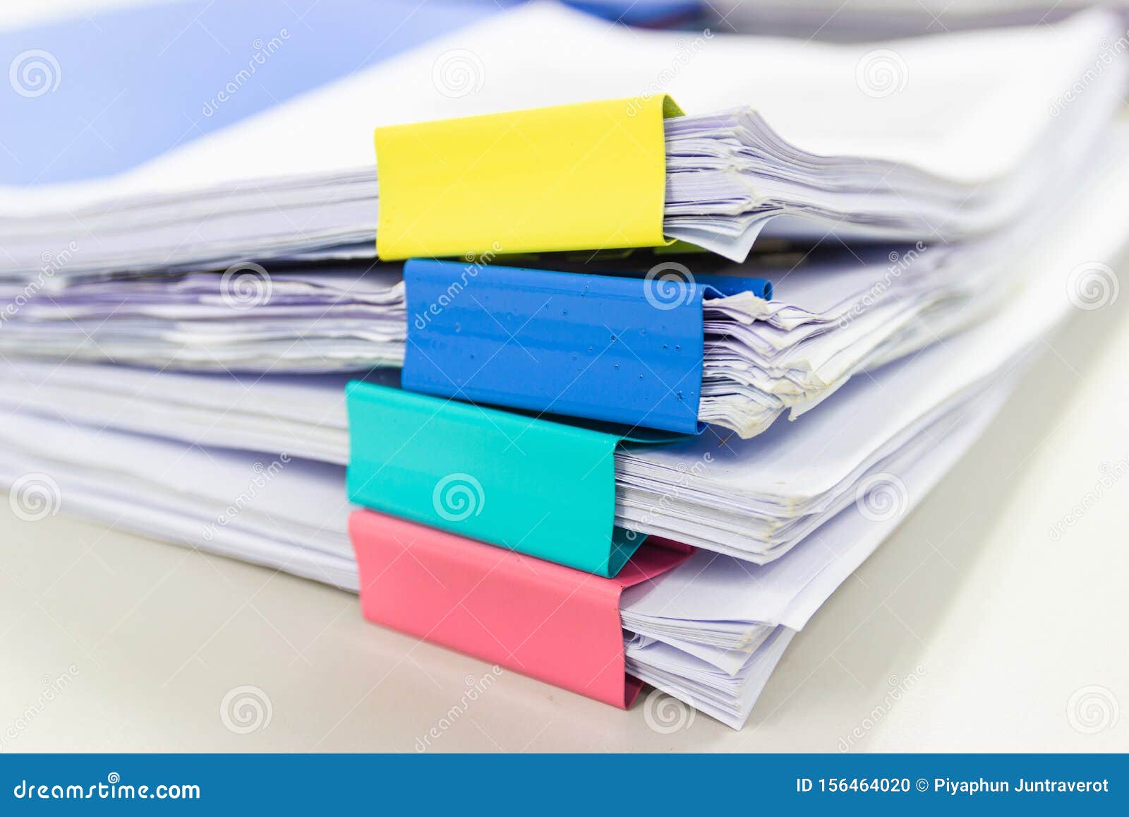 File Folder and Stack of Business Report Paper File on the Table Stock ...