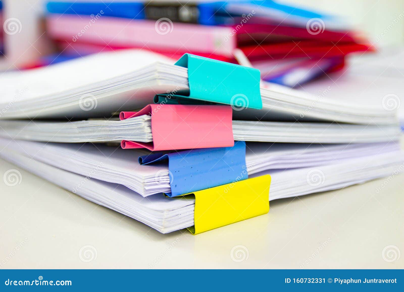 File Folder and Stack of Business Report Paper File on the Table Stock ...