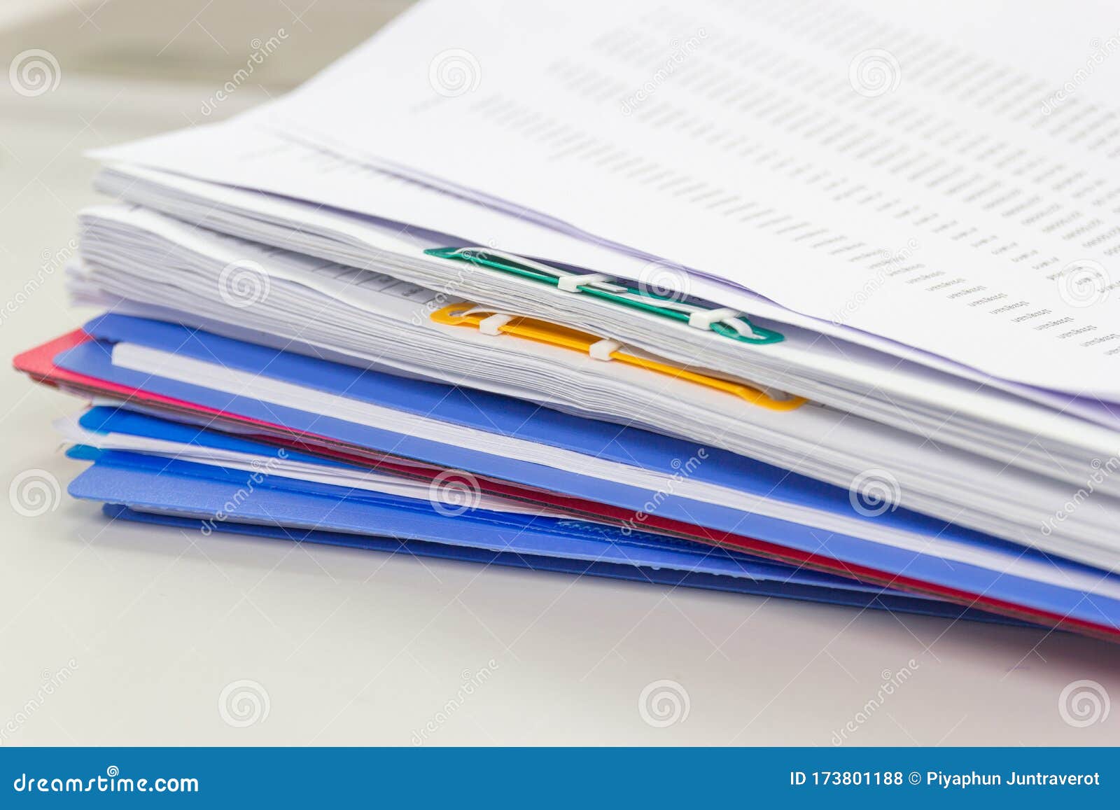 File Folder and Stack of Business Report Paper File on the Table Stock ...