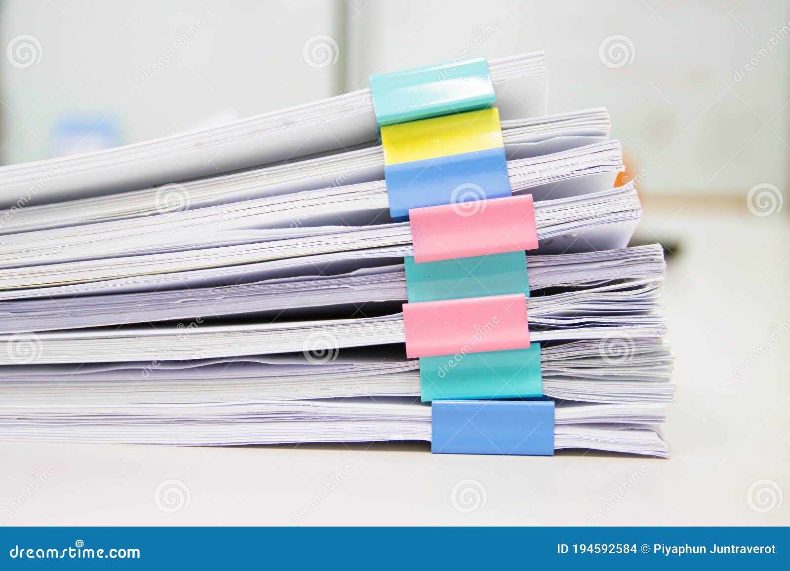 File Folder and Stack of Business Report Paper File on the Table Stock ...