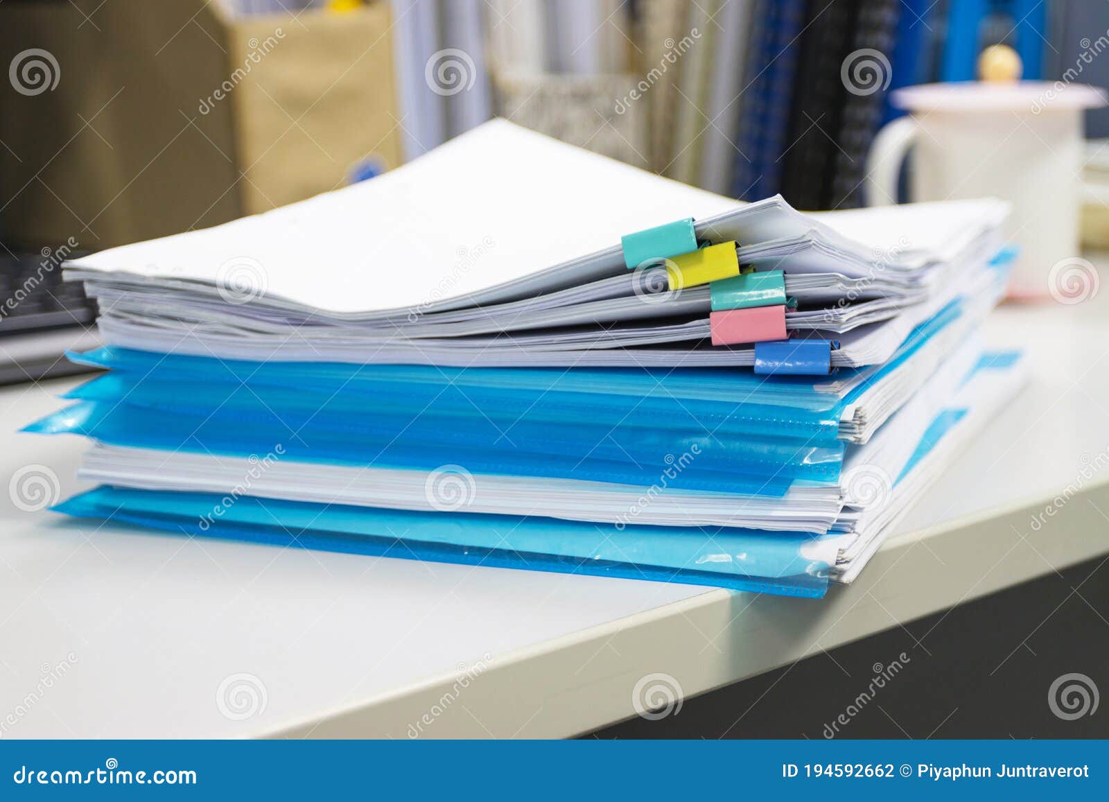 File Folder and Stack of Business Report Paper File on the Table Stock ...