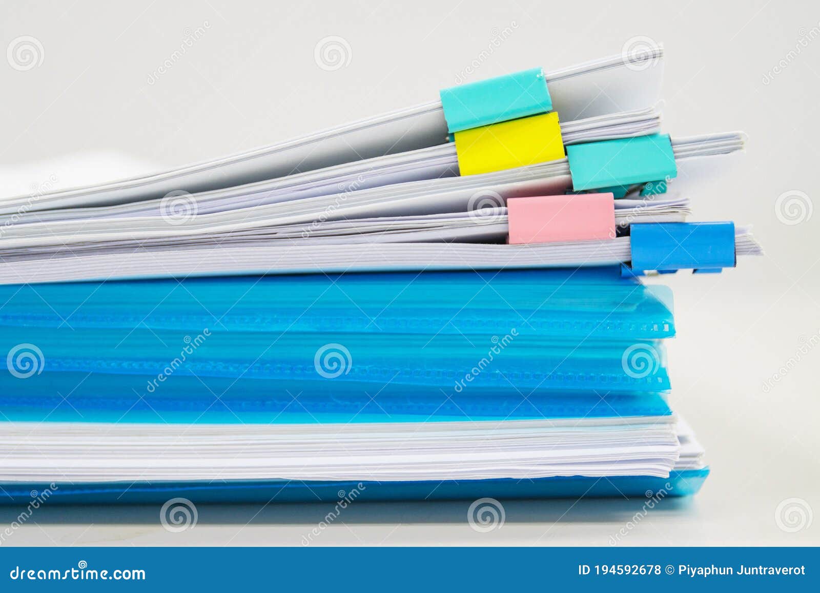File Folder and Stack of Business Report Paper File on the Table Stock ...