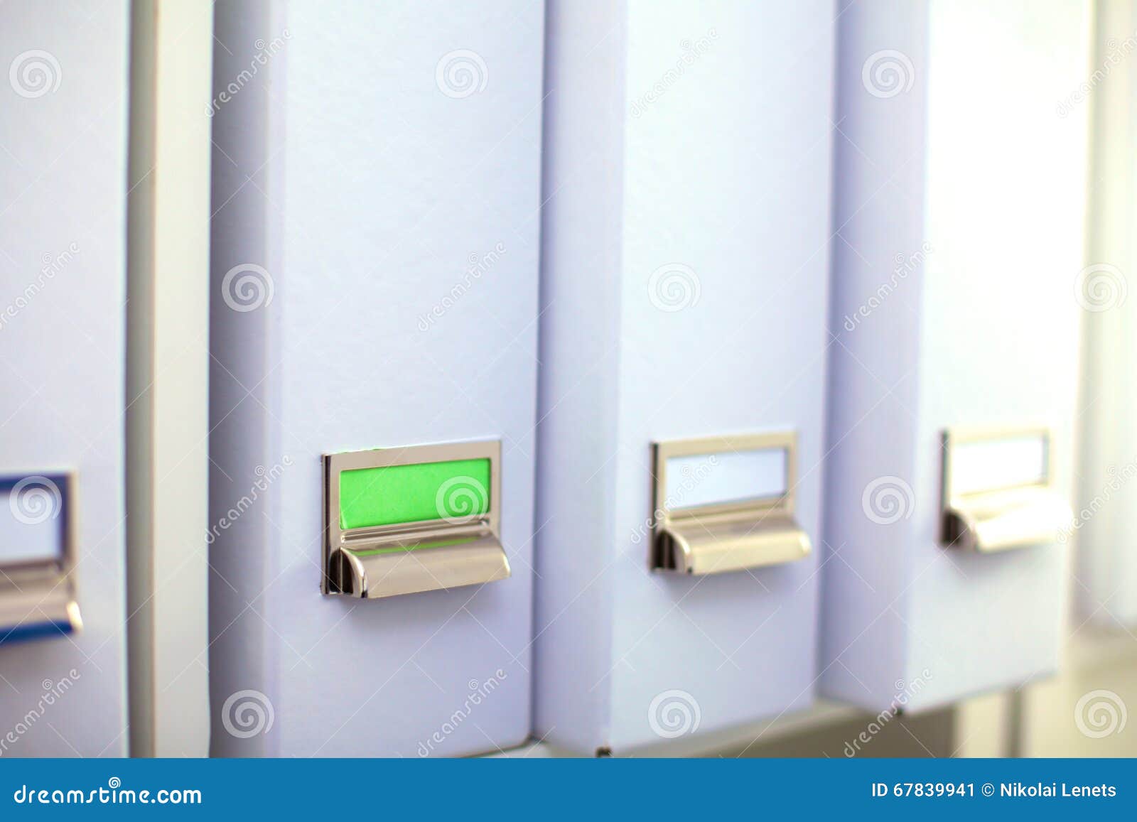 File Folders, Standing on Shelves in the Background Stock Image - Image ...