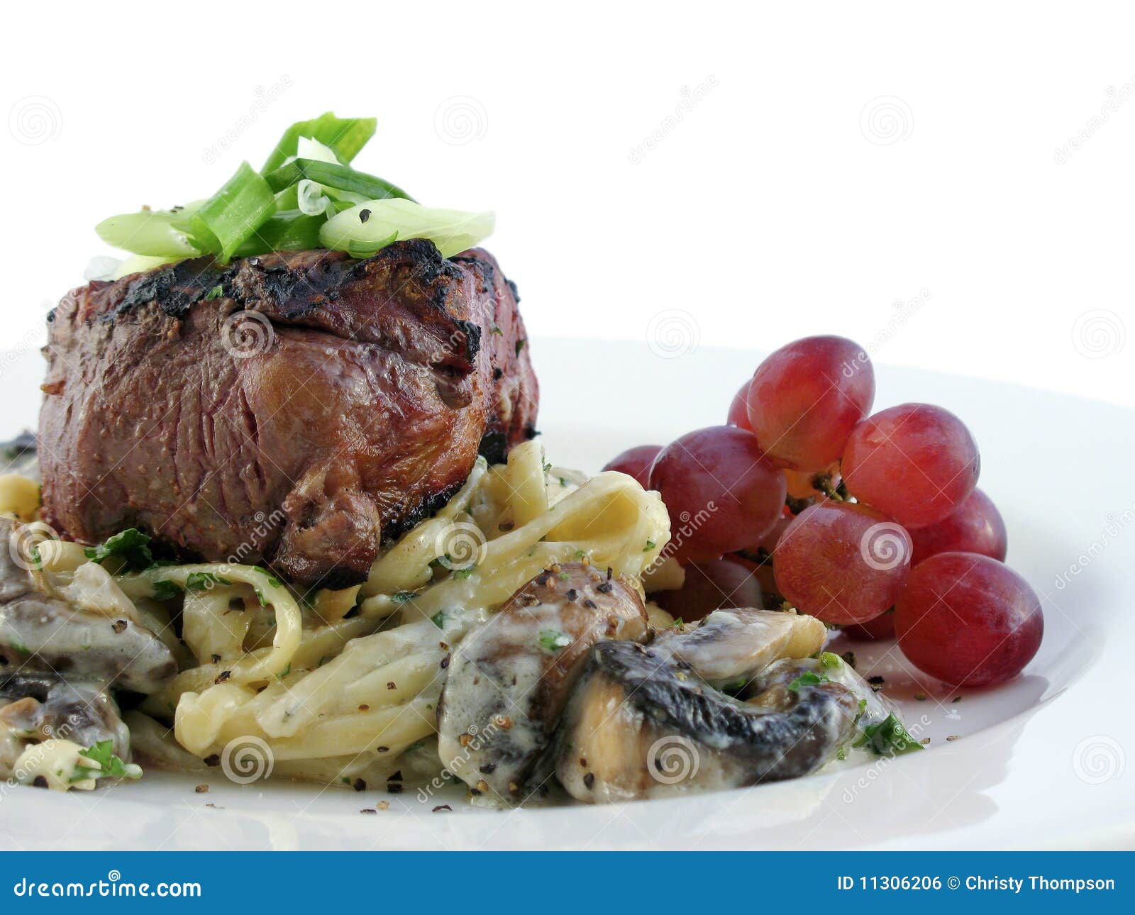 Filet mignon over pasta stock photo. Image of dining - 11306206