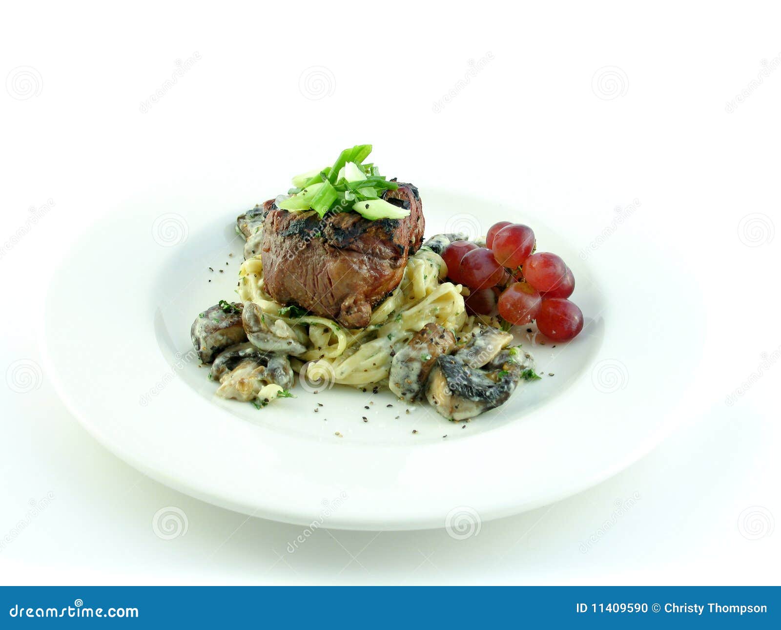 Filet mignon over pasta stock photo. Image of grape, sirloin - 11409590