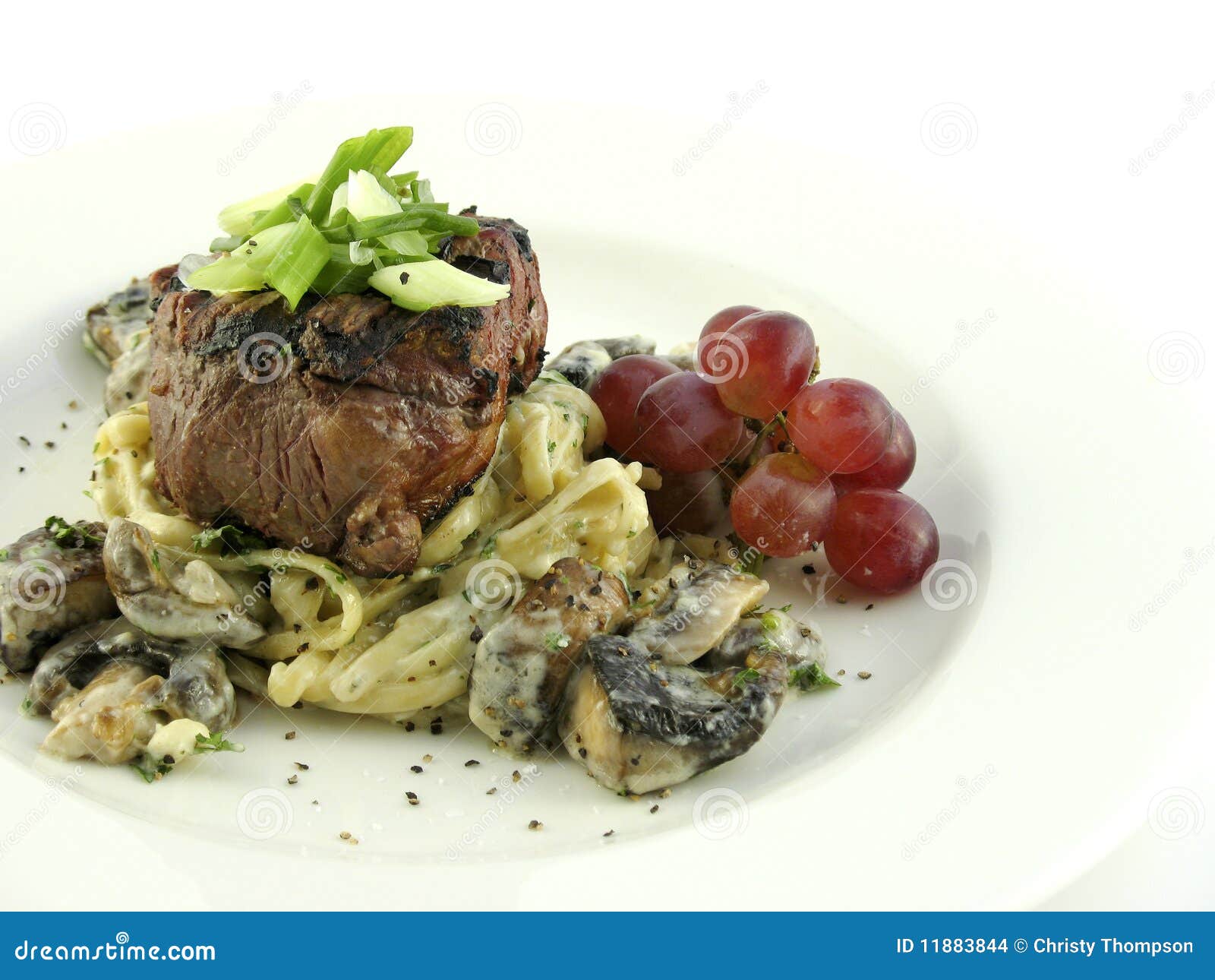 Filet mignon over pasta stock photo. Image of eating - 11883844