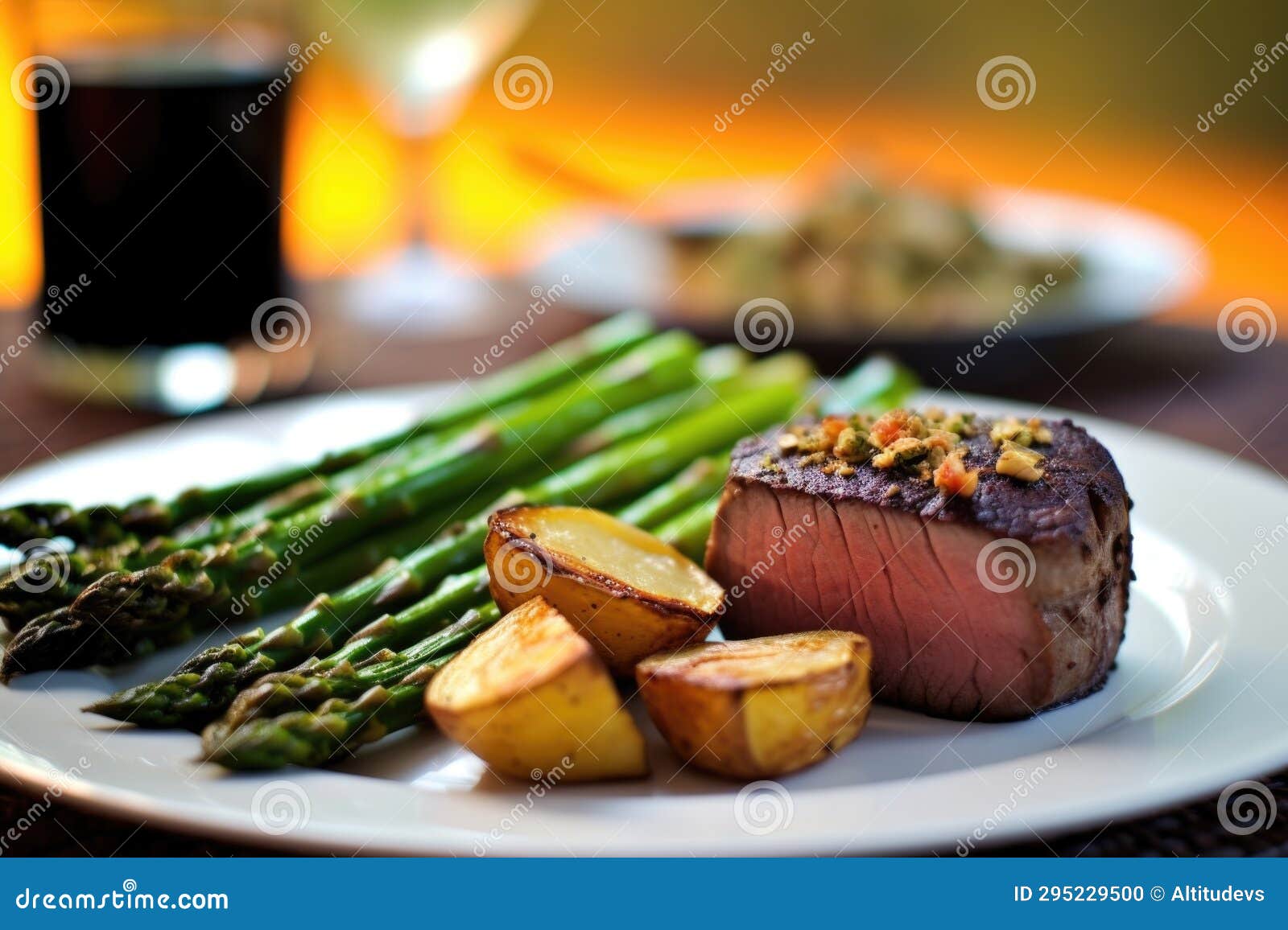Filet Mignon on Plate with Roasted Potatoes and Asparagus Stock Photo ...