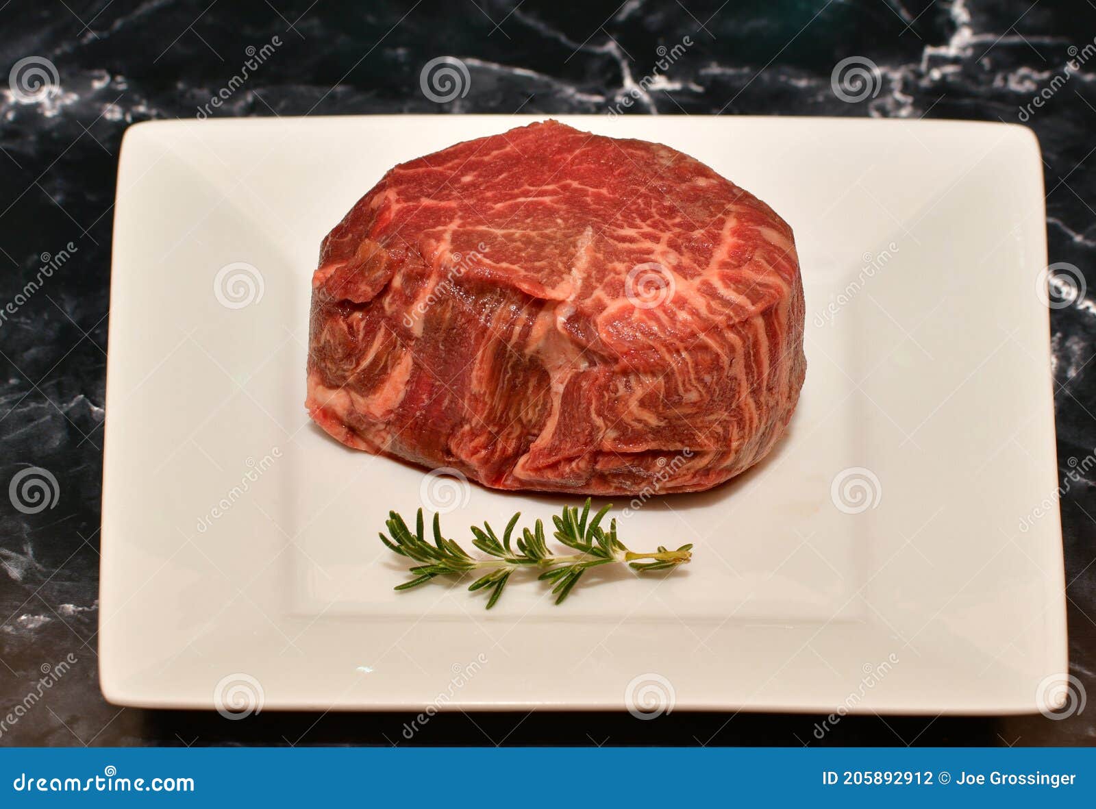 Wagyu Filet Mignon Not Cooked on White Dish Stock Photo - Image of ...