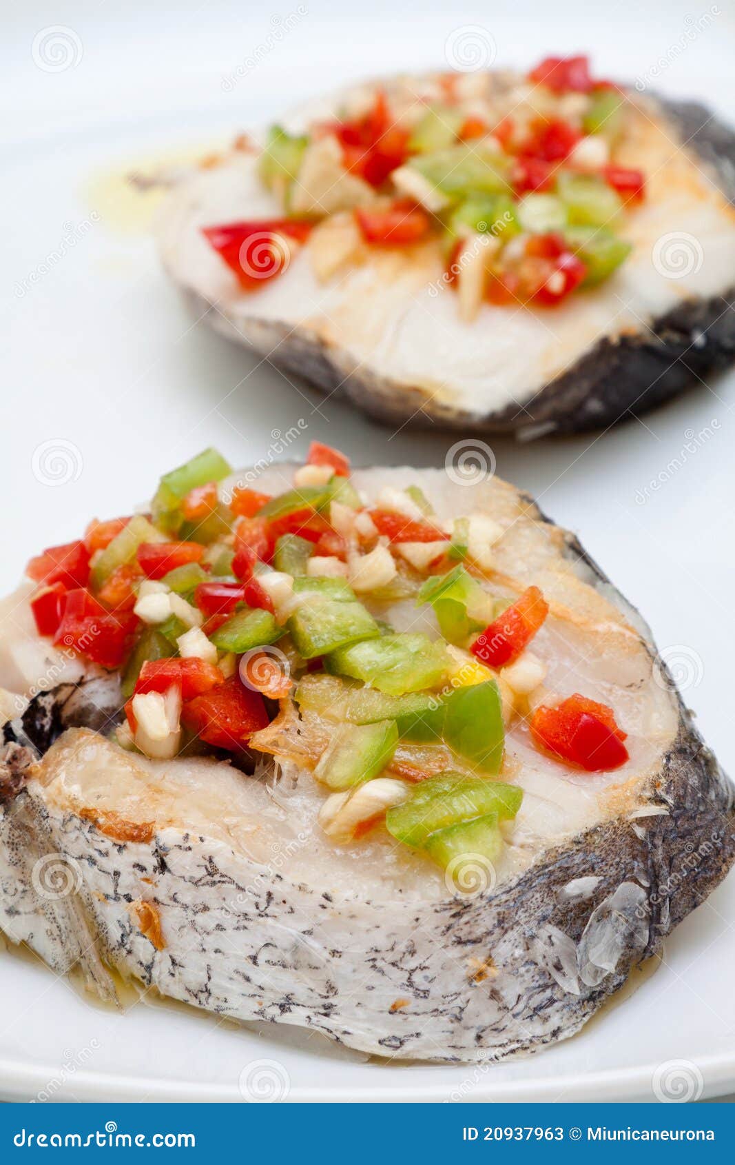 Filetes De La Merluza Con Pimientas Imagen de archivo - Imagen de ...