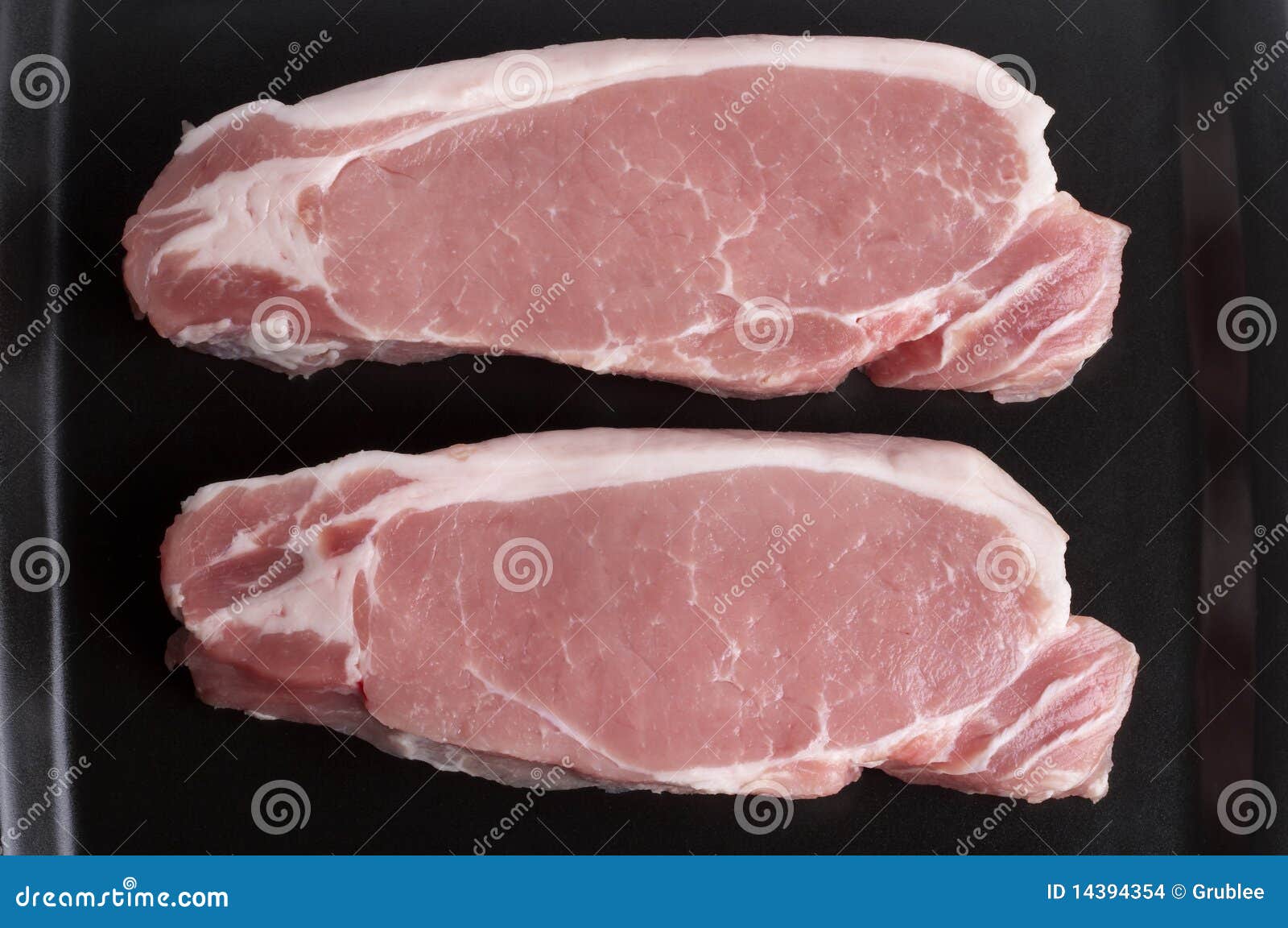 Filetes del cerdo foto de archivo. Imagen de travieso - 14394354