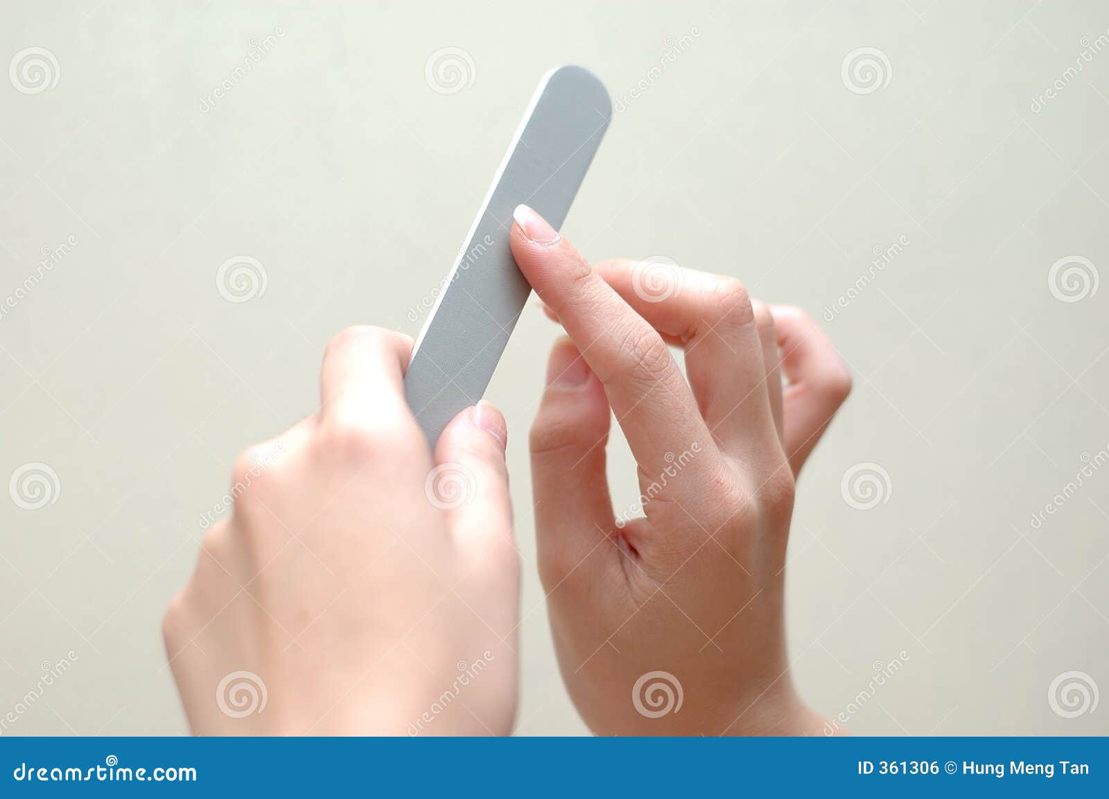 Filing finger nails stock photo. Image of lifestyle, happy - 361306