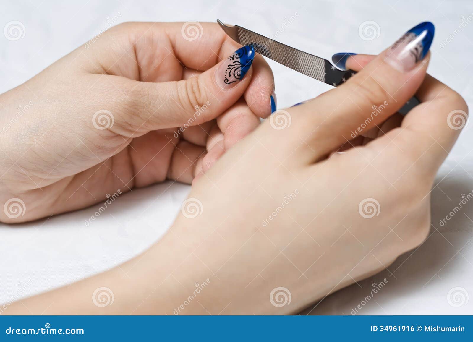 Filing nails stock photo. Image of file, hand, nails - 34961916