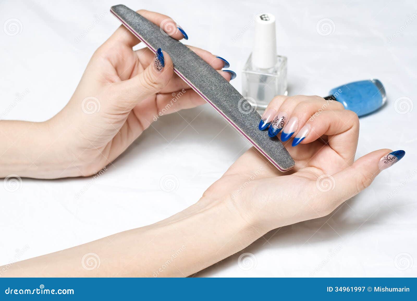 Filing nails stock image. Image of file, polish, girl - 34961997
