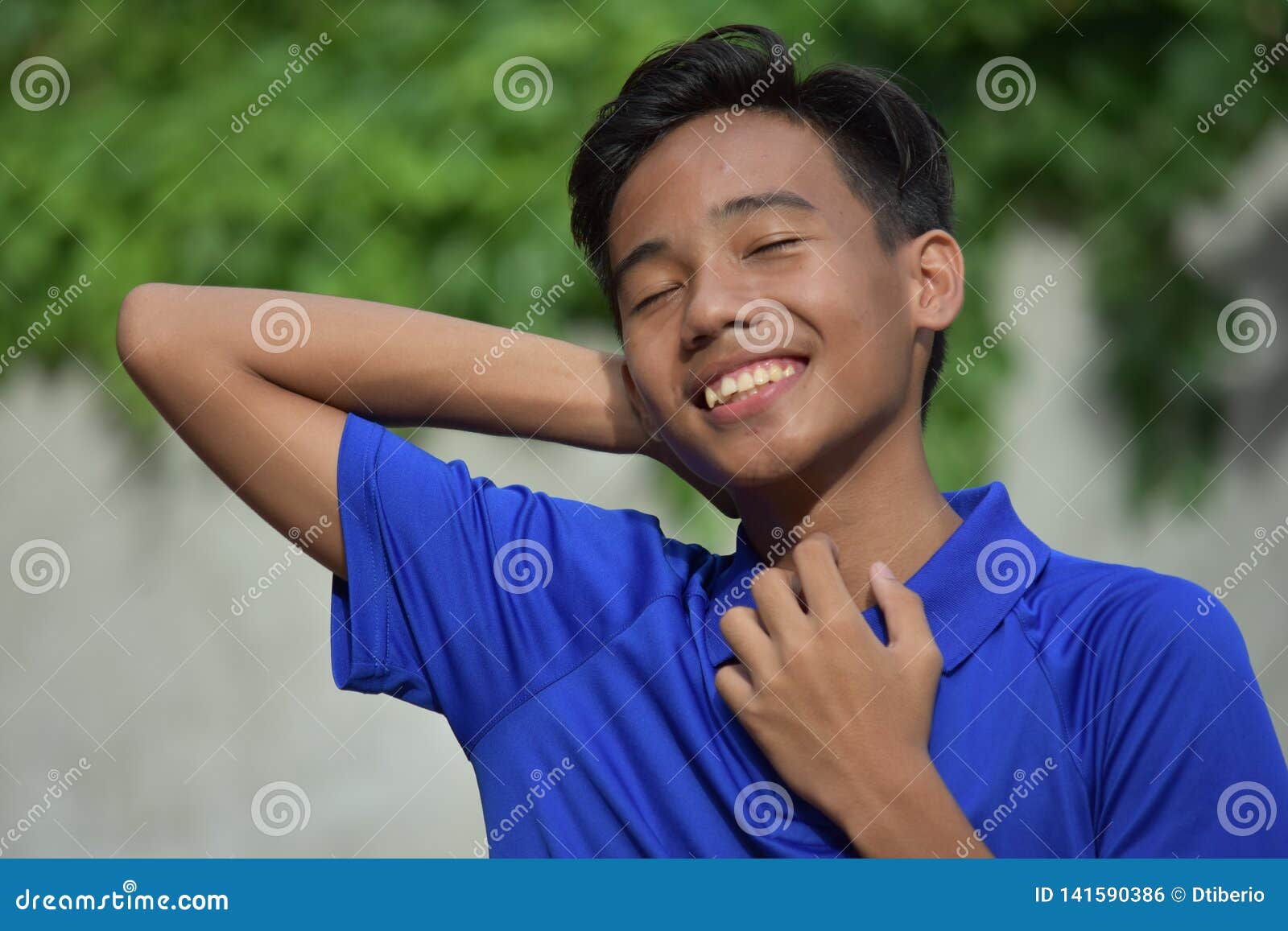 A Filipino Boy Relaxing stock photo. Image of youth - 141590386